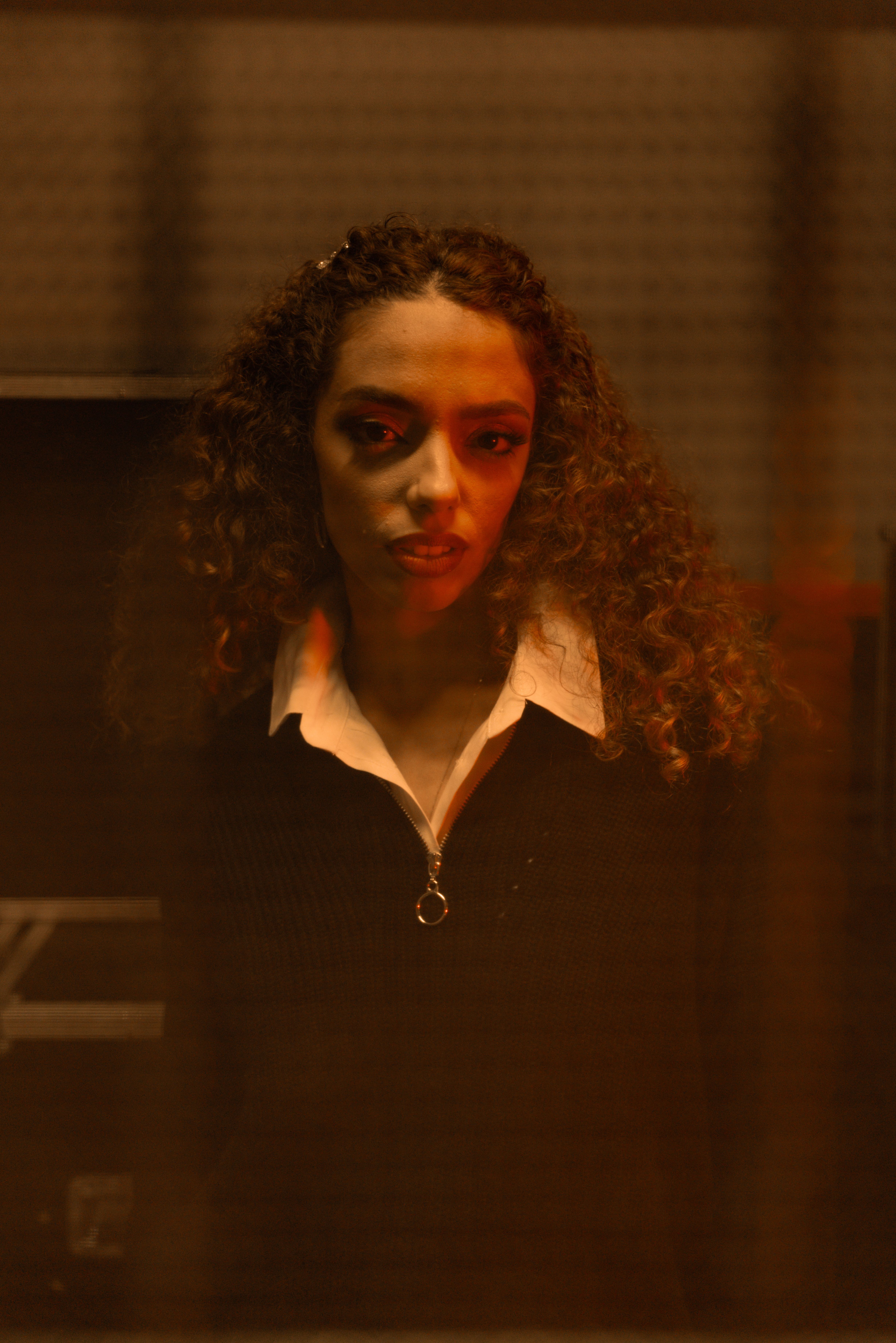 Moody Portrait of Woman in Warm Lighting · Free Stock Photo