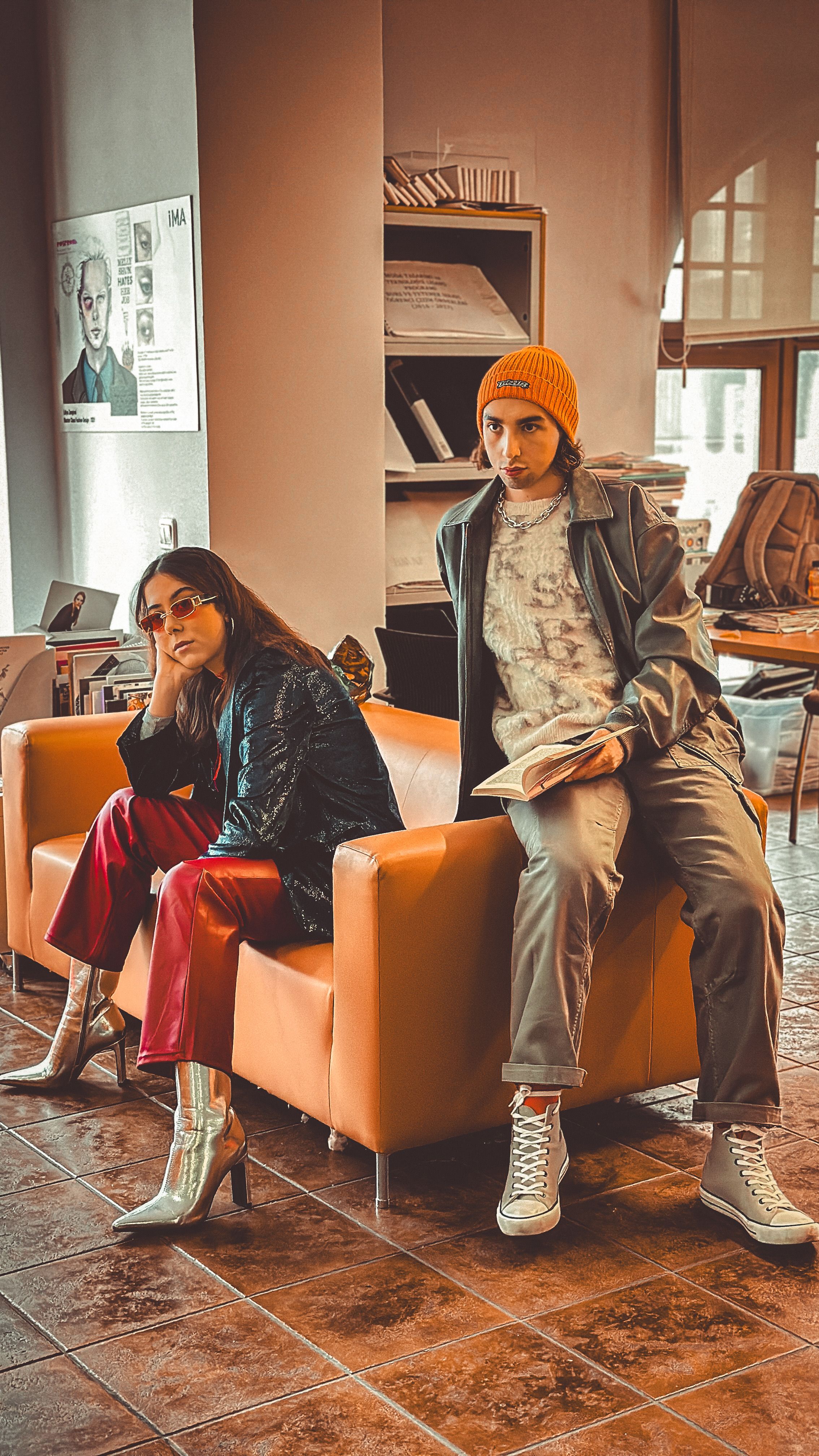 Trendy Young Adults Relaxing in Stylish Lounge · Free Stock Photo