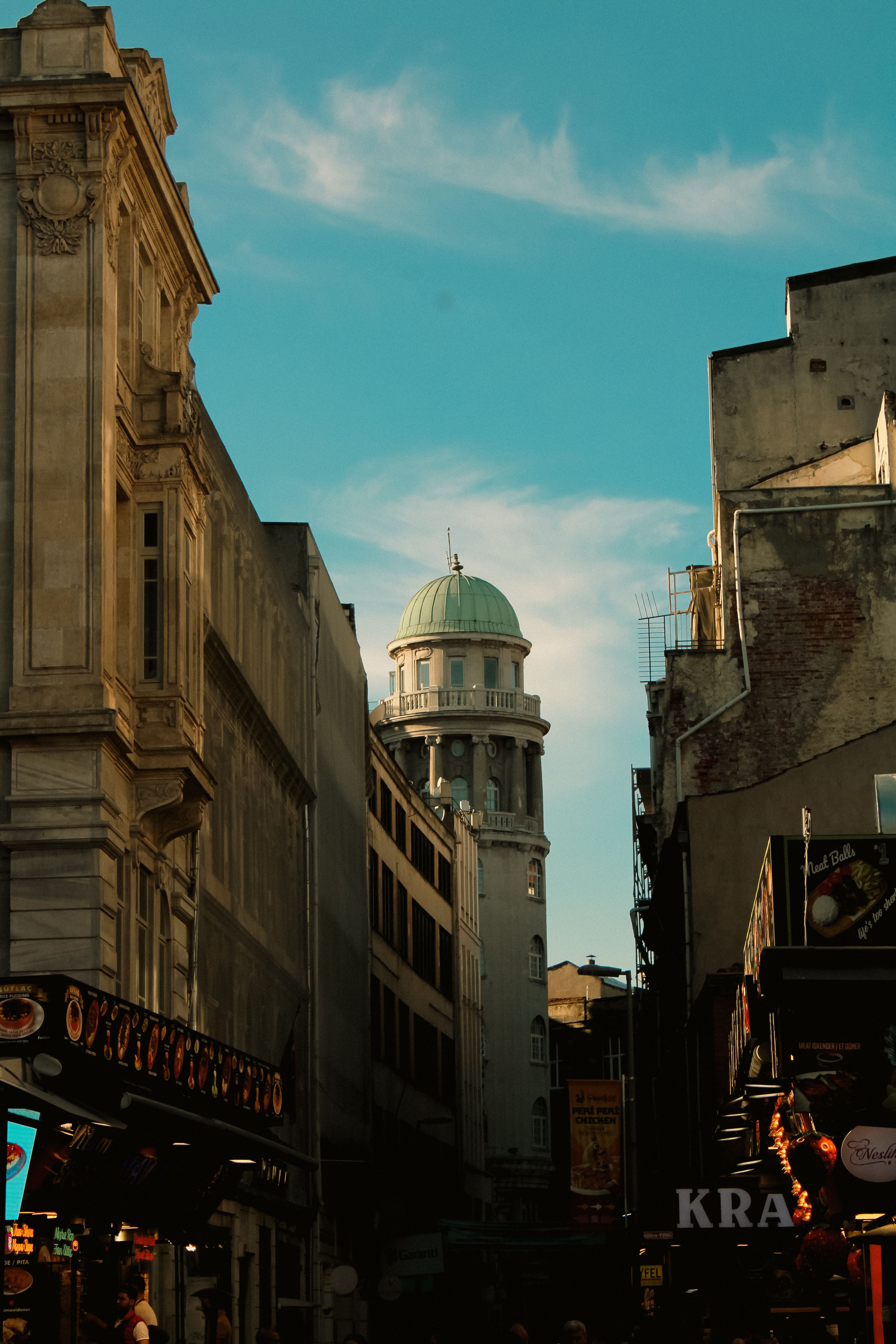 Historic Urban Street with Dome Building in Background · Free Stock Photo