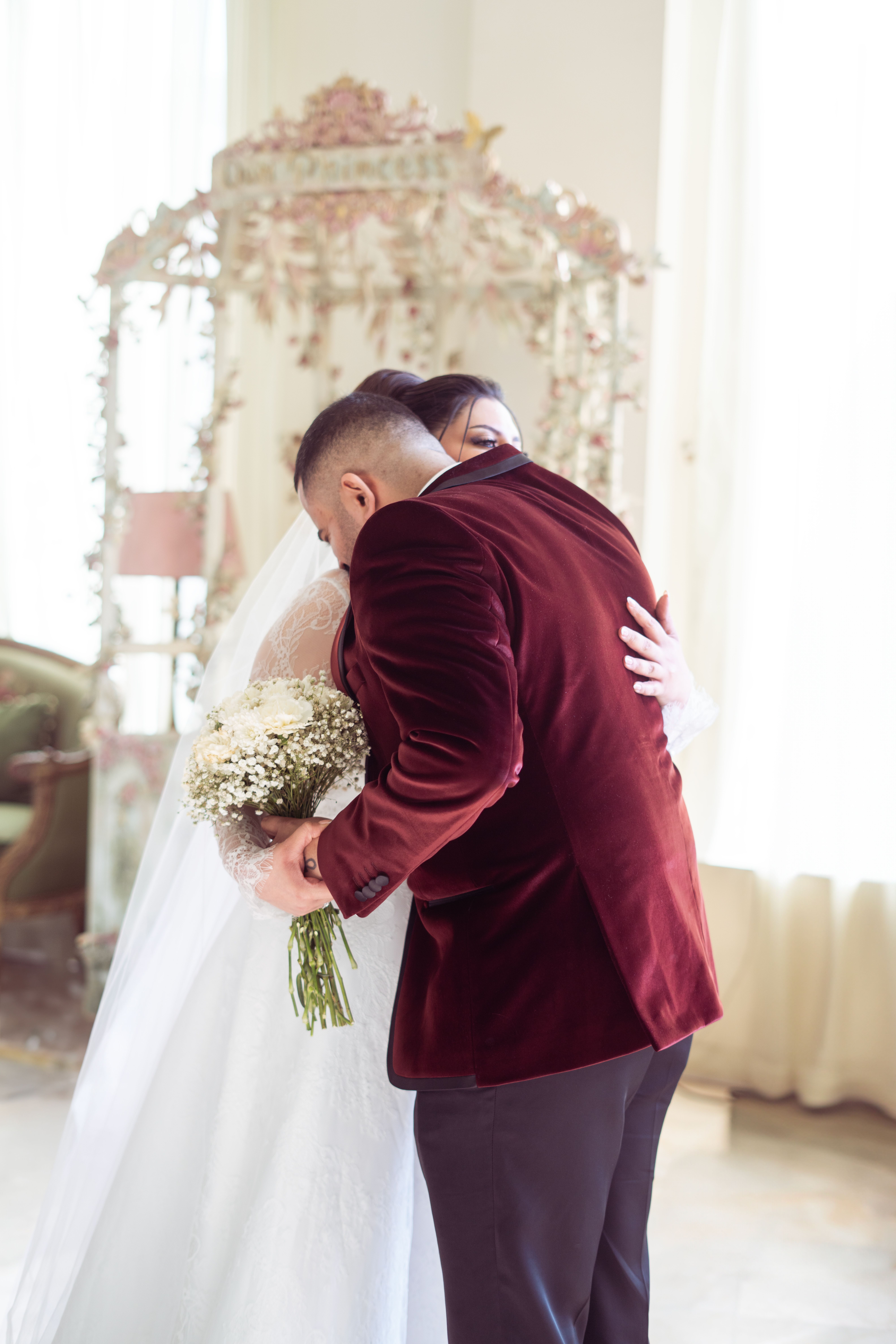 Elegant Wedding Hug in Baghdad Ceremony Venue · Free Stock Photo