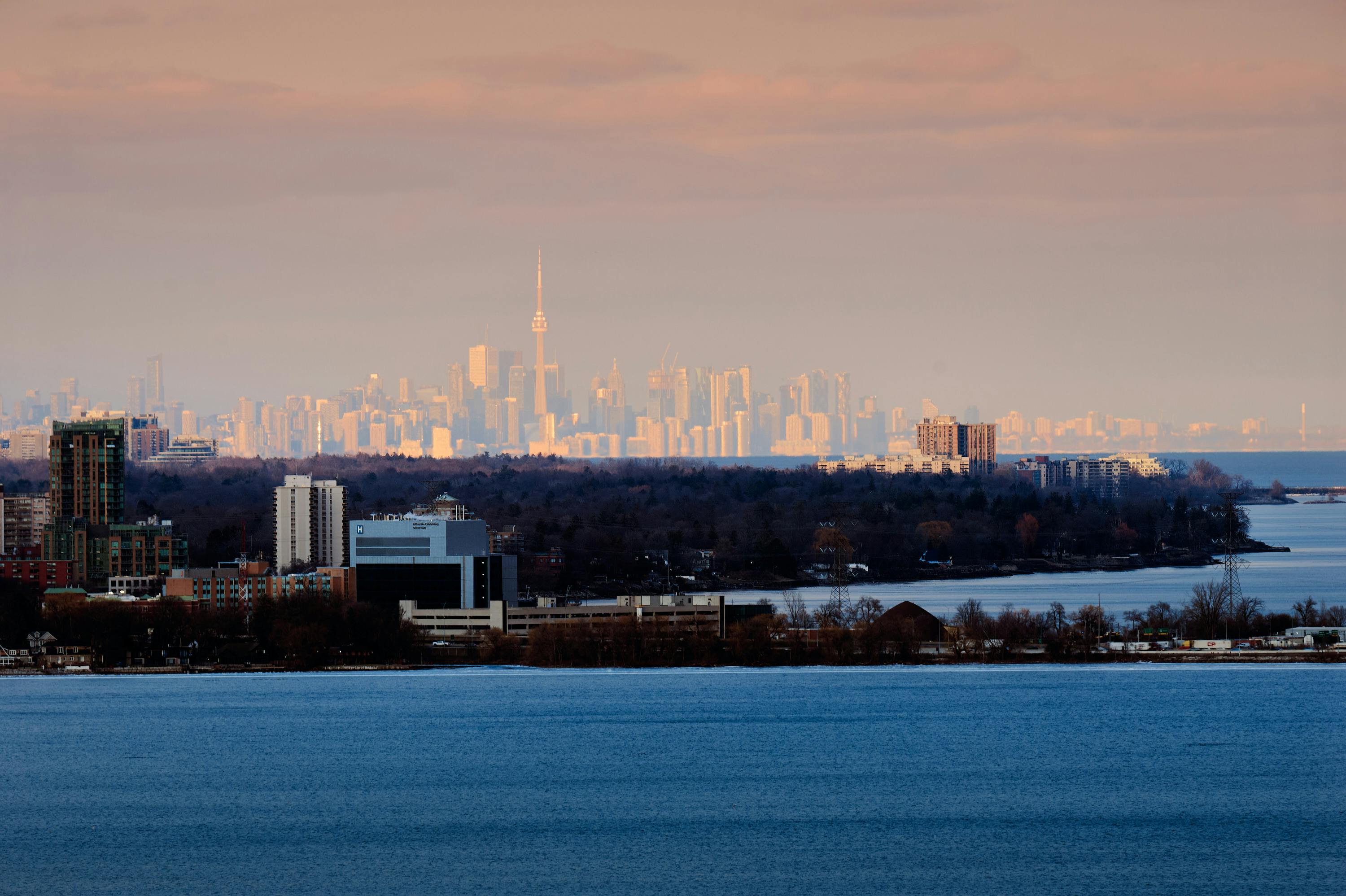 Distant View of Toronto Skyline at Sunset · Free Stock Photo