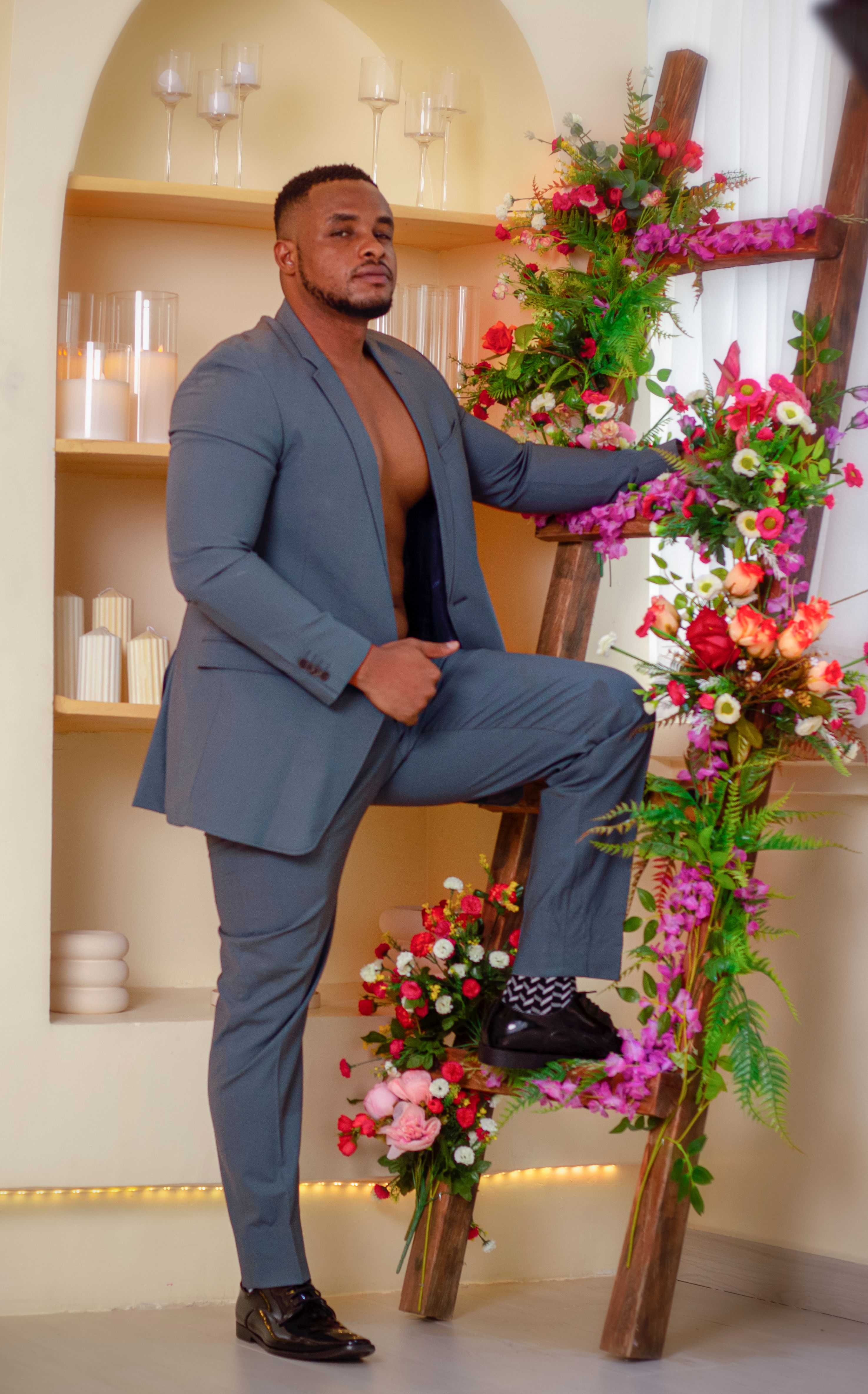 Stylish Man in Suit During Floral Fashion Photoshoot · Free Stock Photo