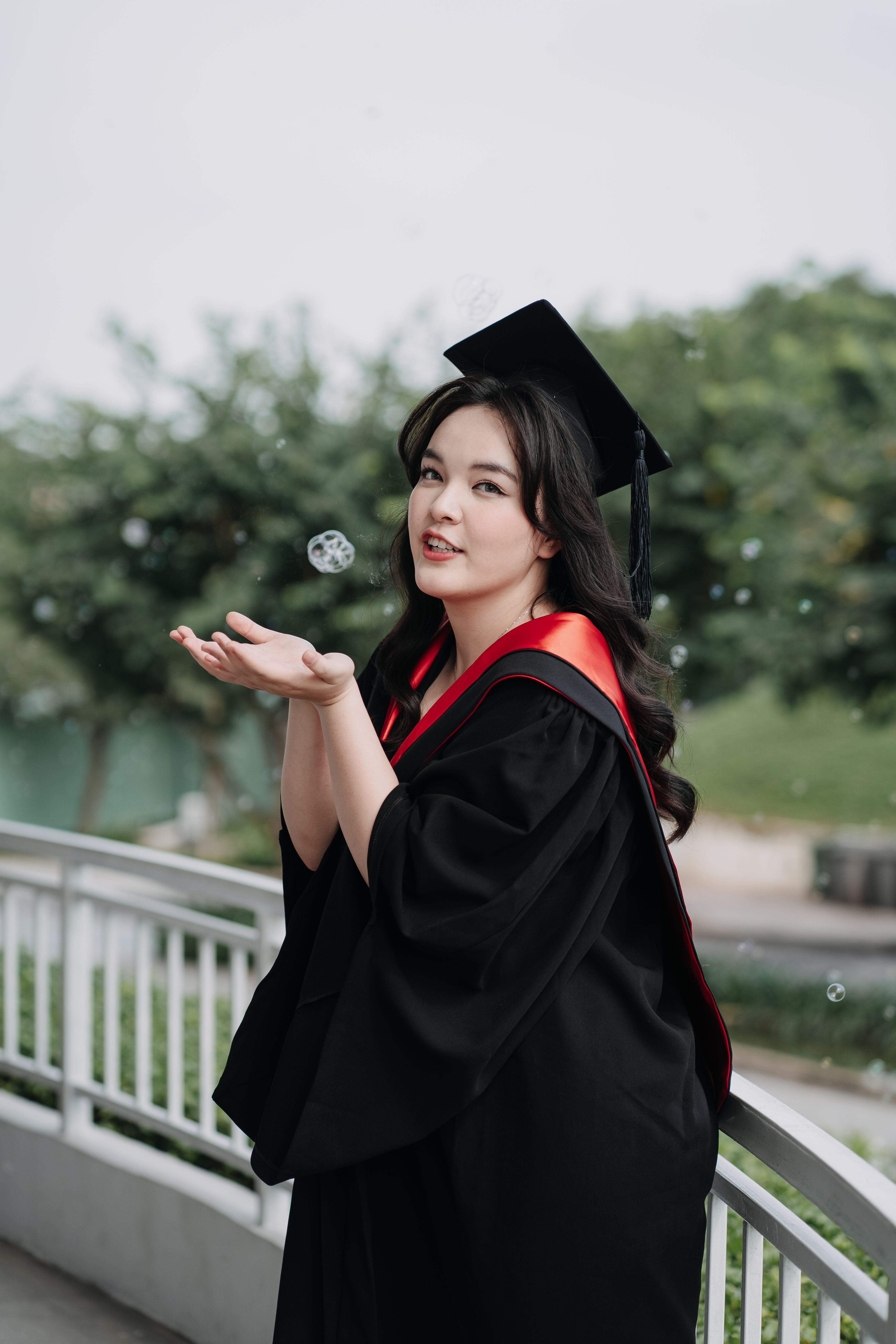 Graduation Celebration with Bubbles Outdoors · Free Stock Photo