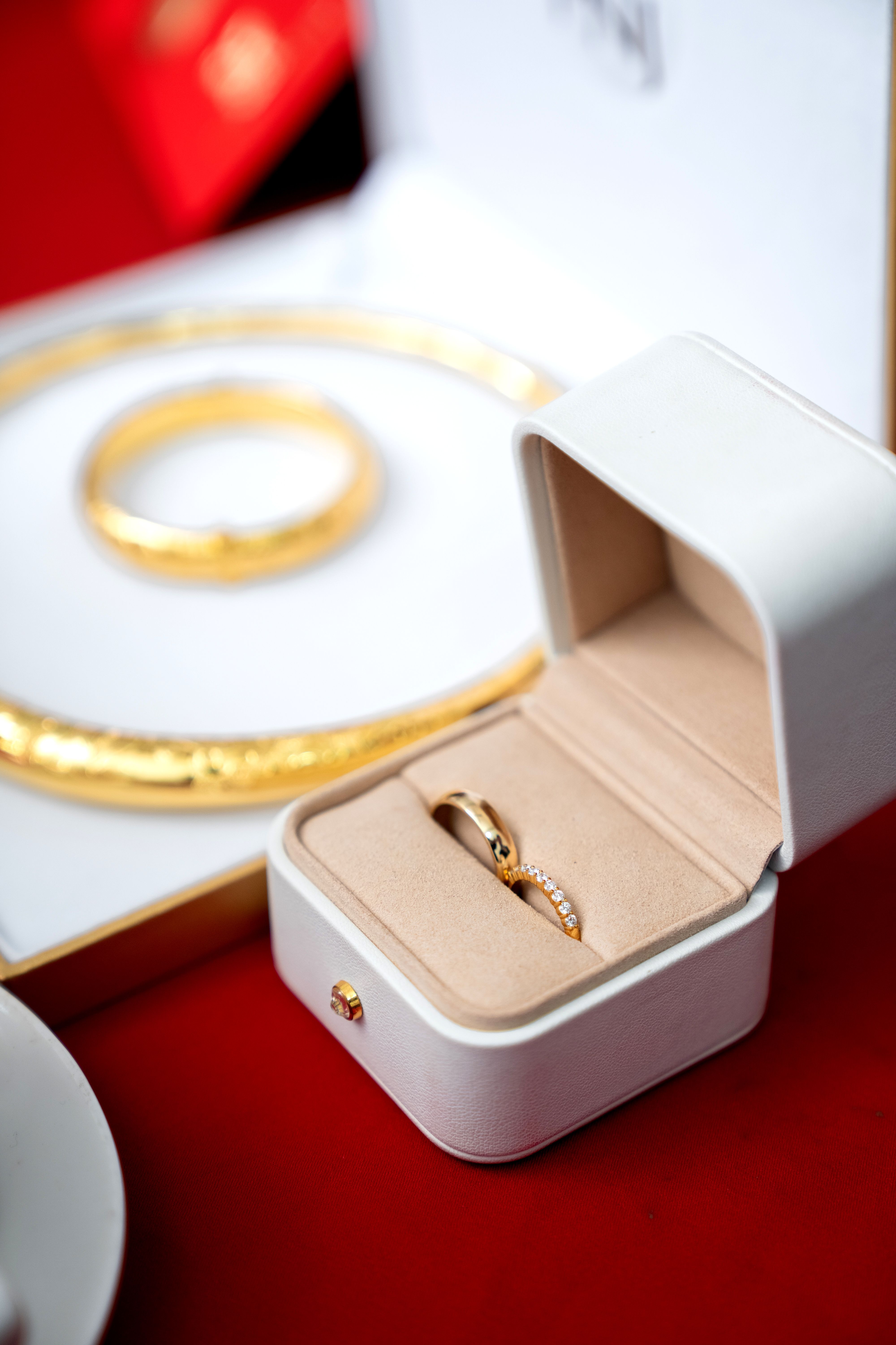 Elegant Gold Ring and Bracelet Set in Jewelry Box · Free Stock Photo