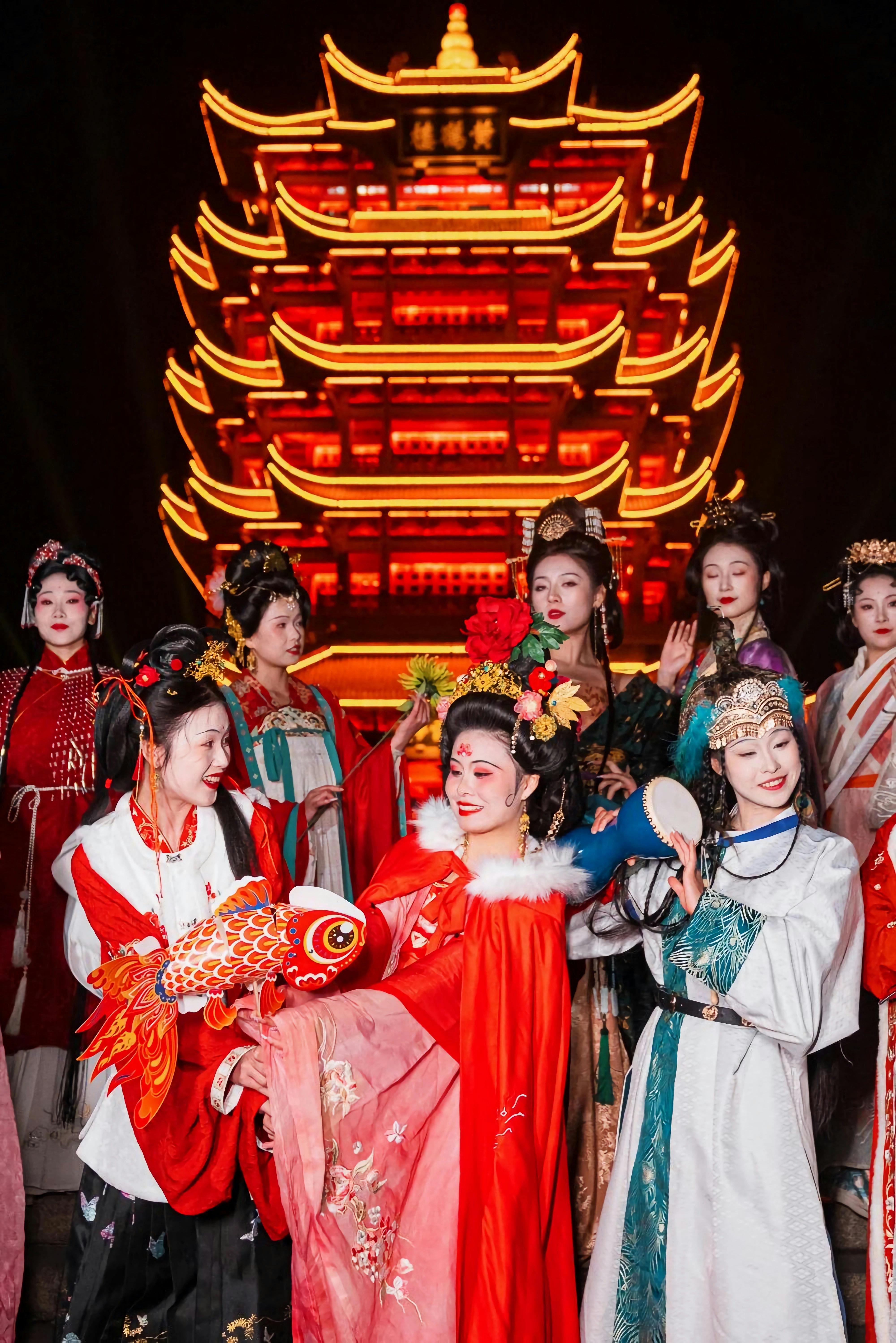 Traditional Chinese Dance in Front of Lit Pavilion · Free Stock Photo