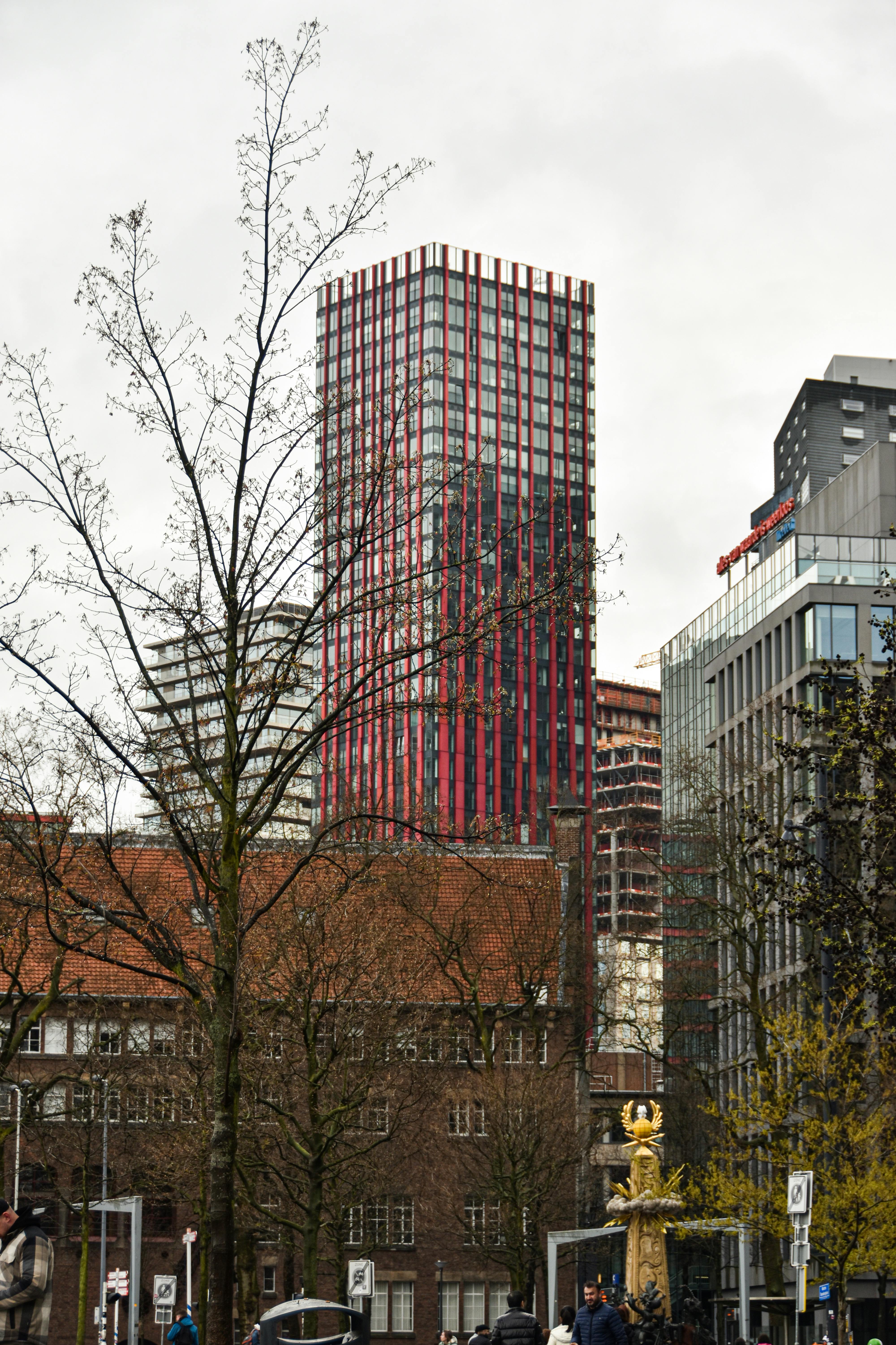 Modern Urban Architecture with Red Skyscraper · Free Stock Photo