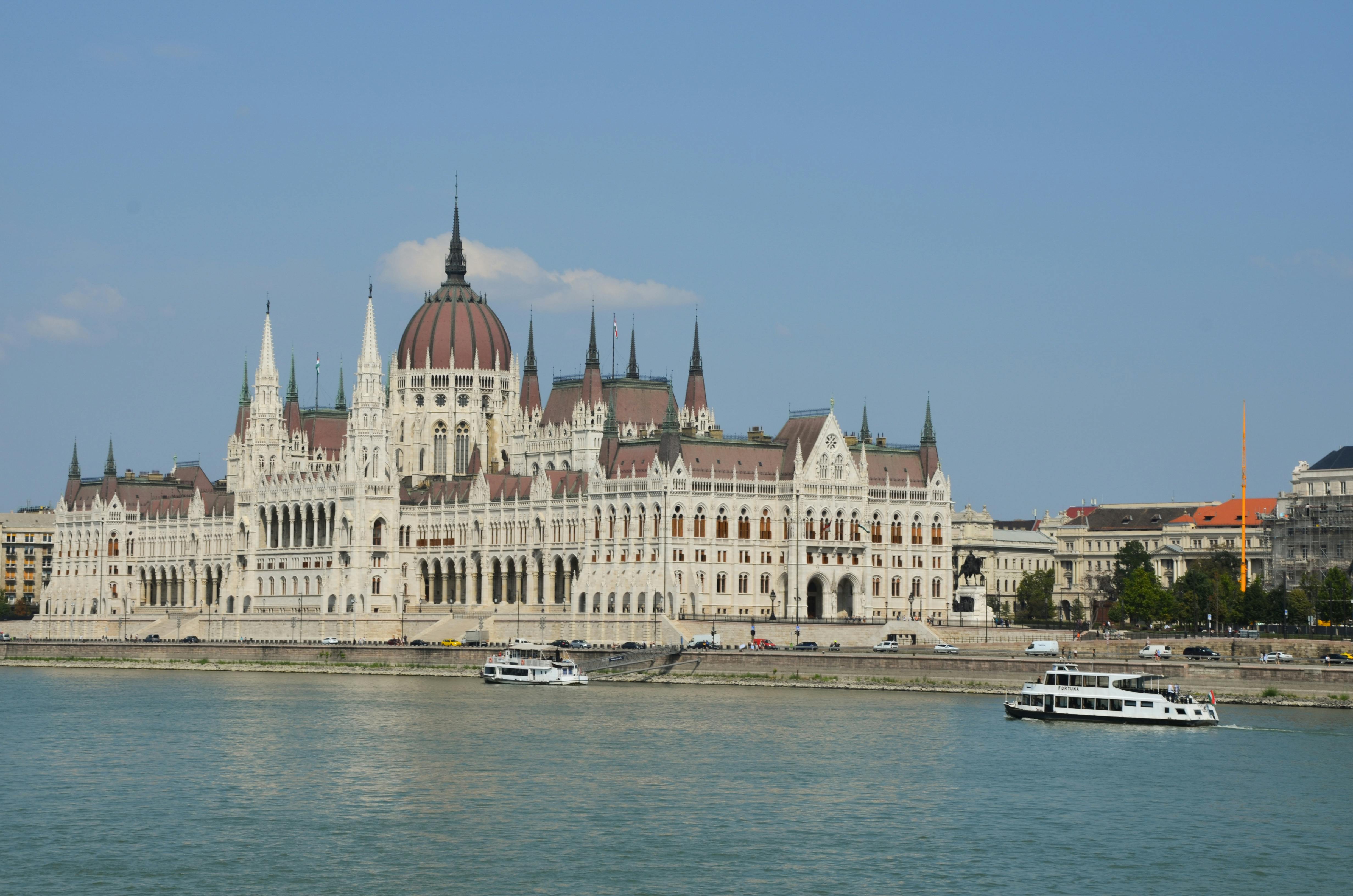 Iconic Budapest Parliament on Danube River · Free Stock Photo