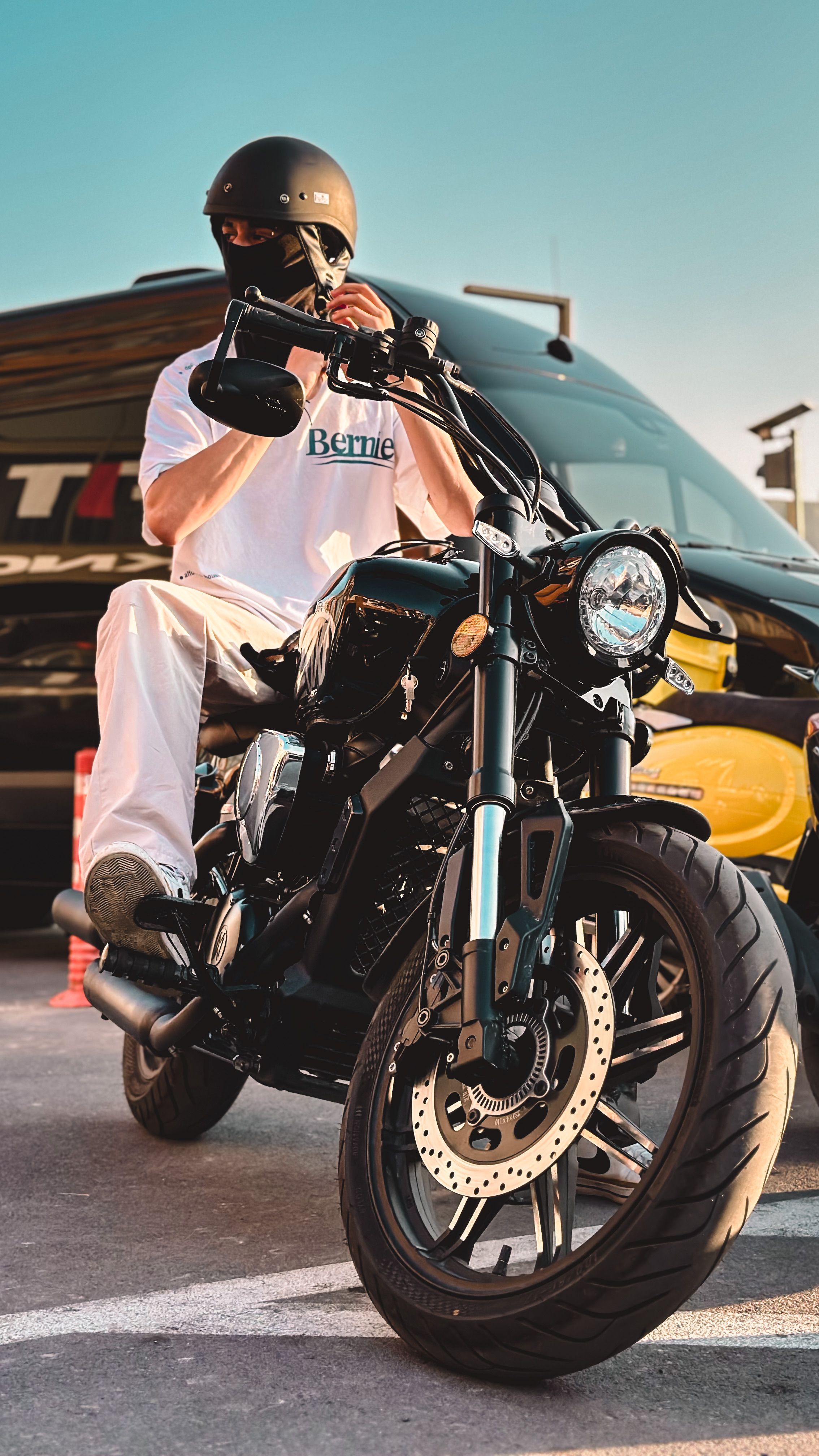 Person Riding Motorcycle in Urban Setting · Free Stock Photo