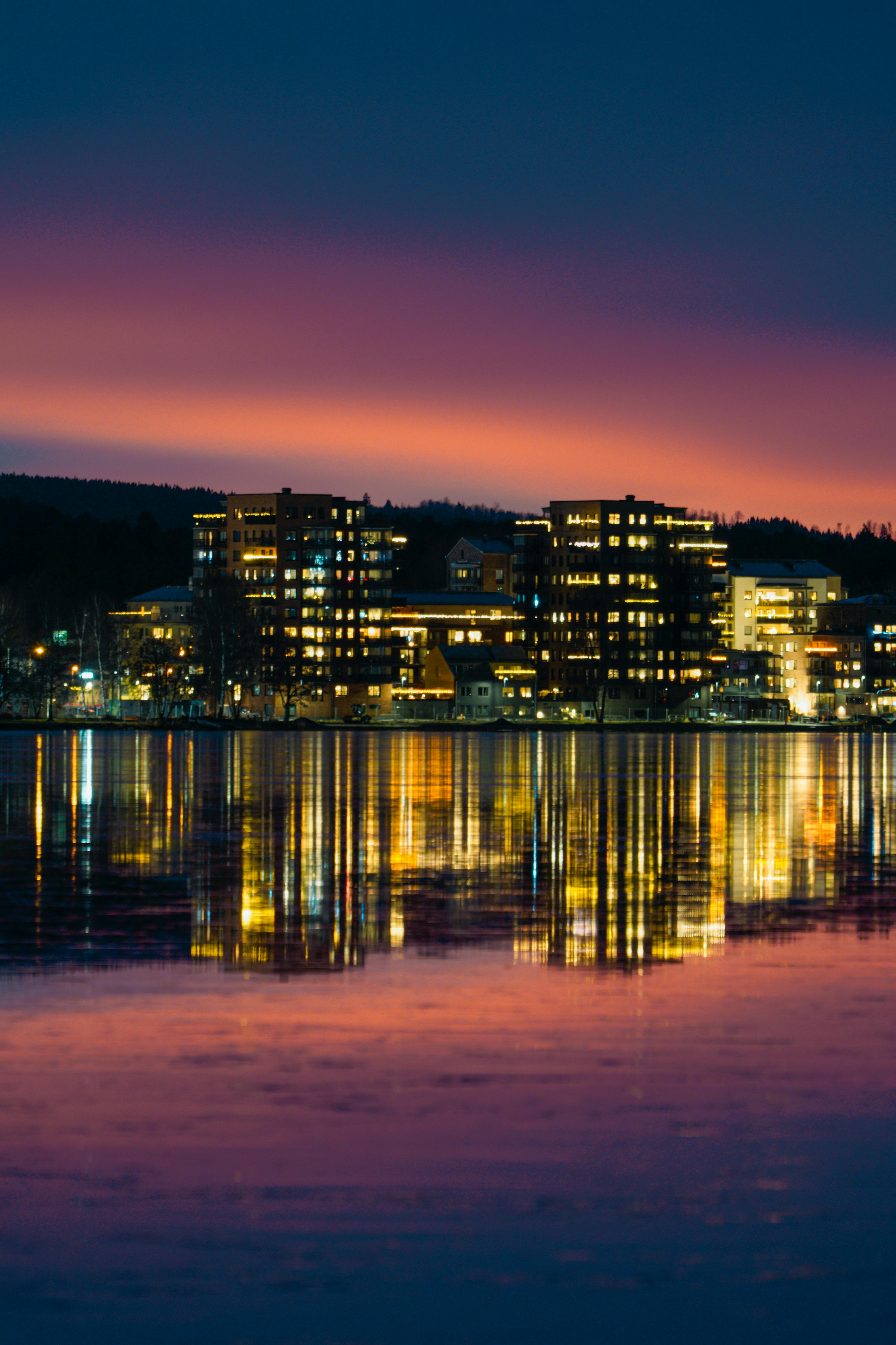 Jönköping Skyline Reflected in Lake at Twilight · Free Stock Photo