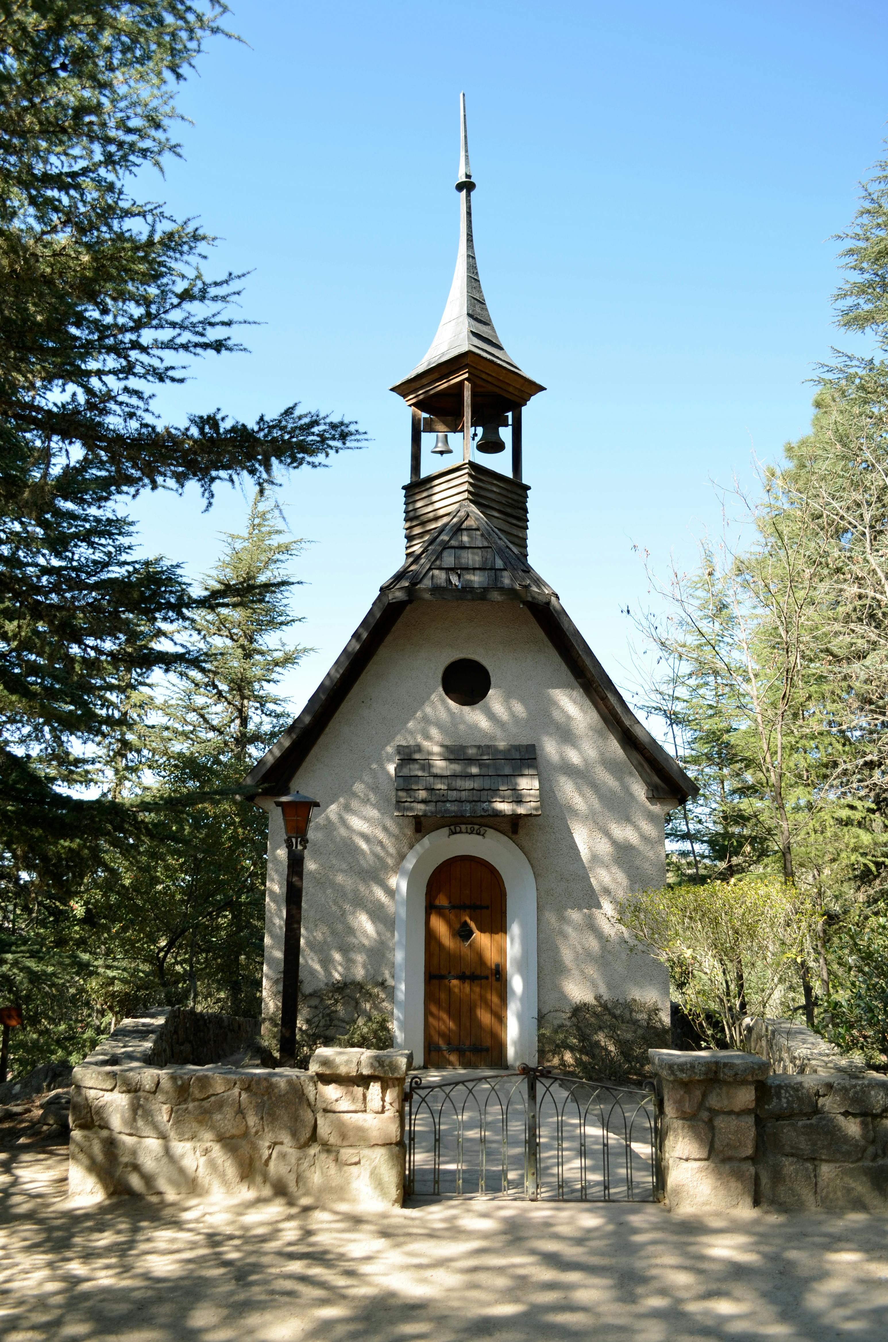 Charming Rustic Chapel in Forest Setting · Free Stock Photo