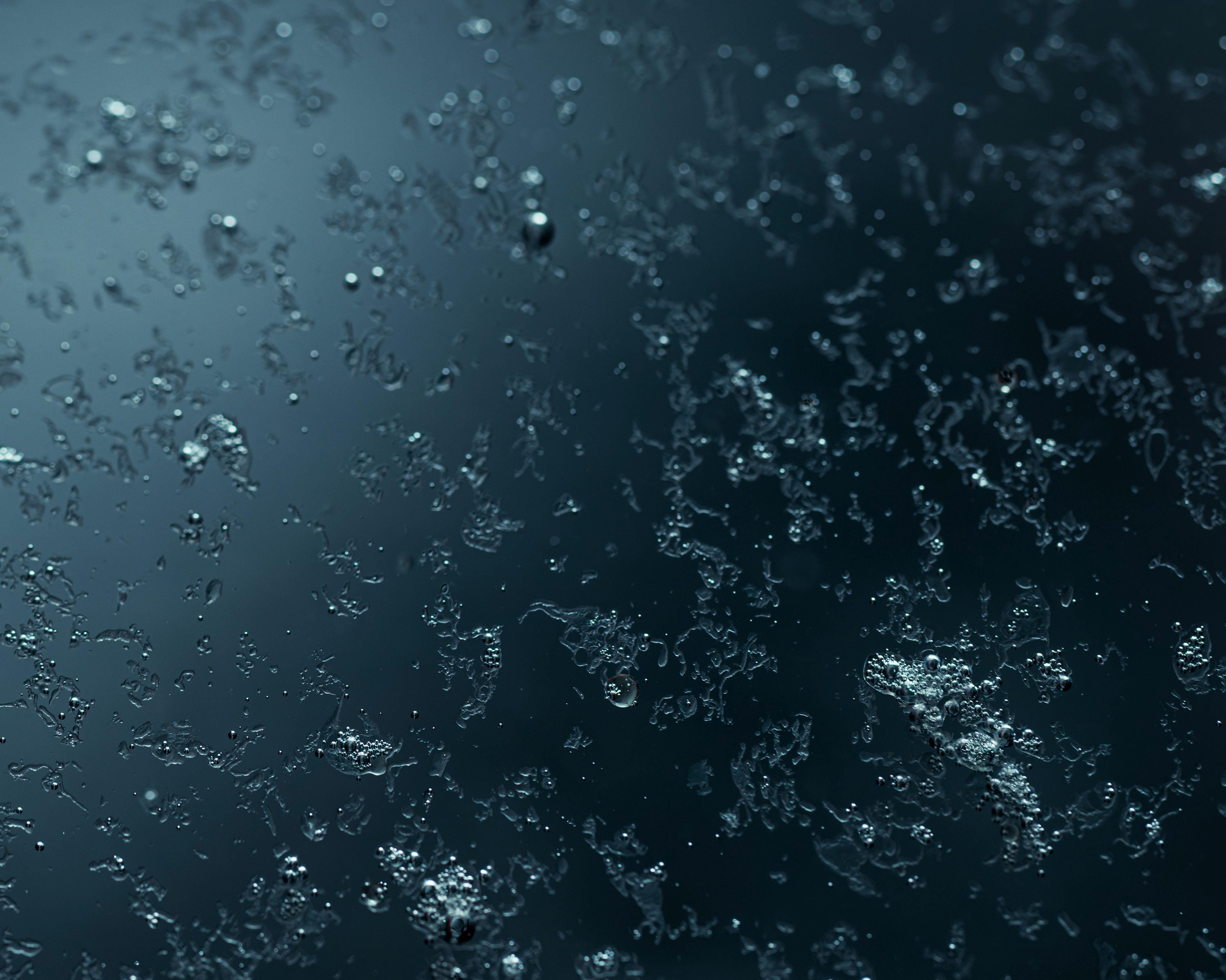 Abstract Water Patterns with Bubbles on Surface · Free Stock Photo