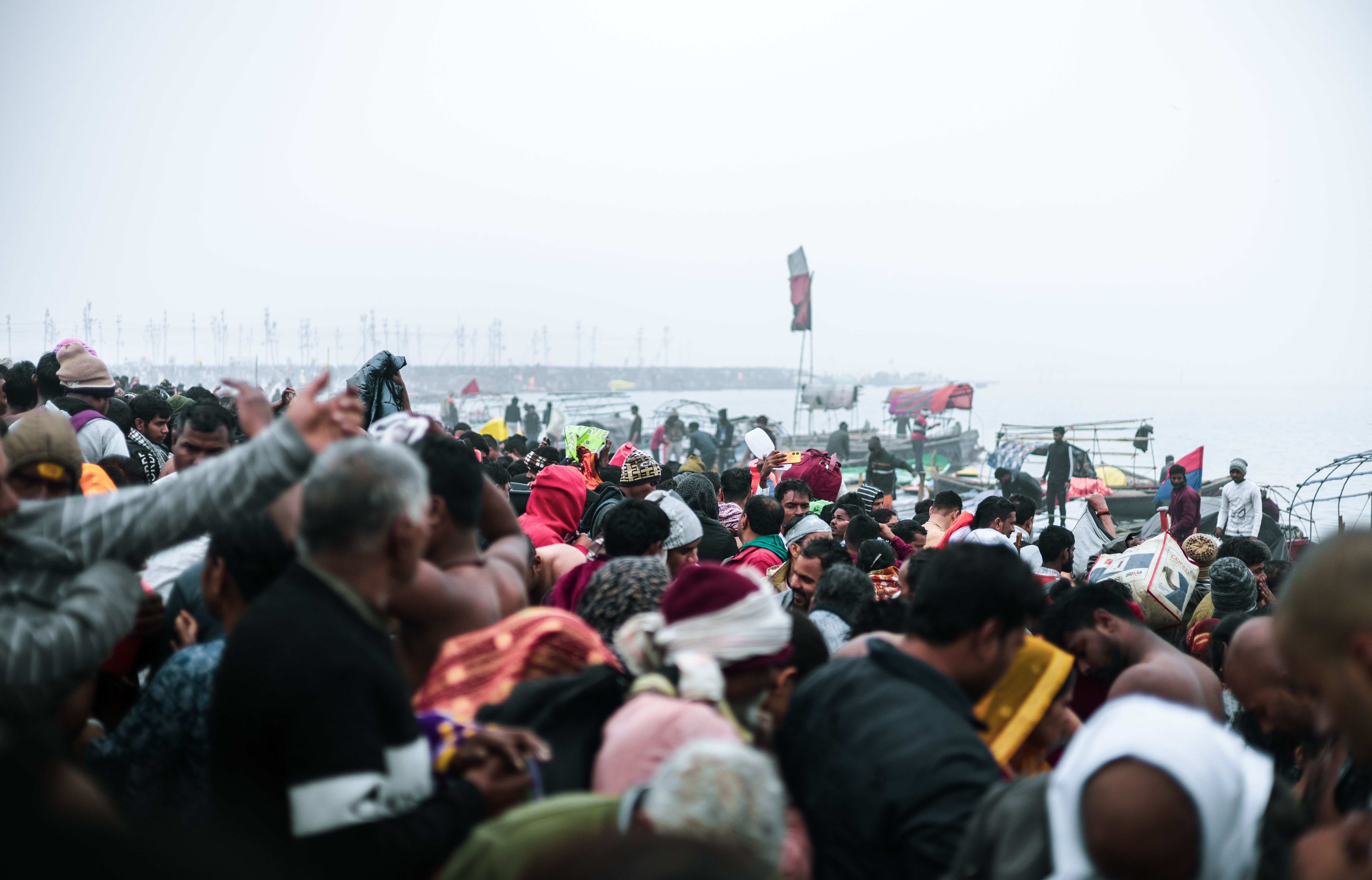 Crowded riverside ceremony with many people · Free Stock Photo