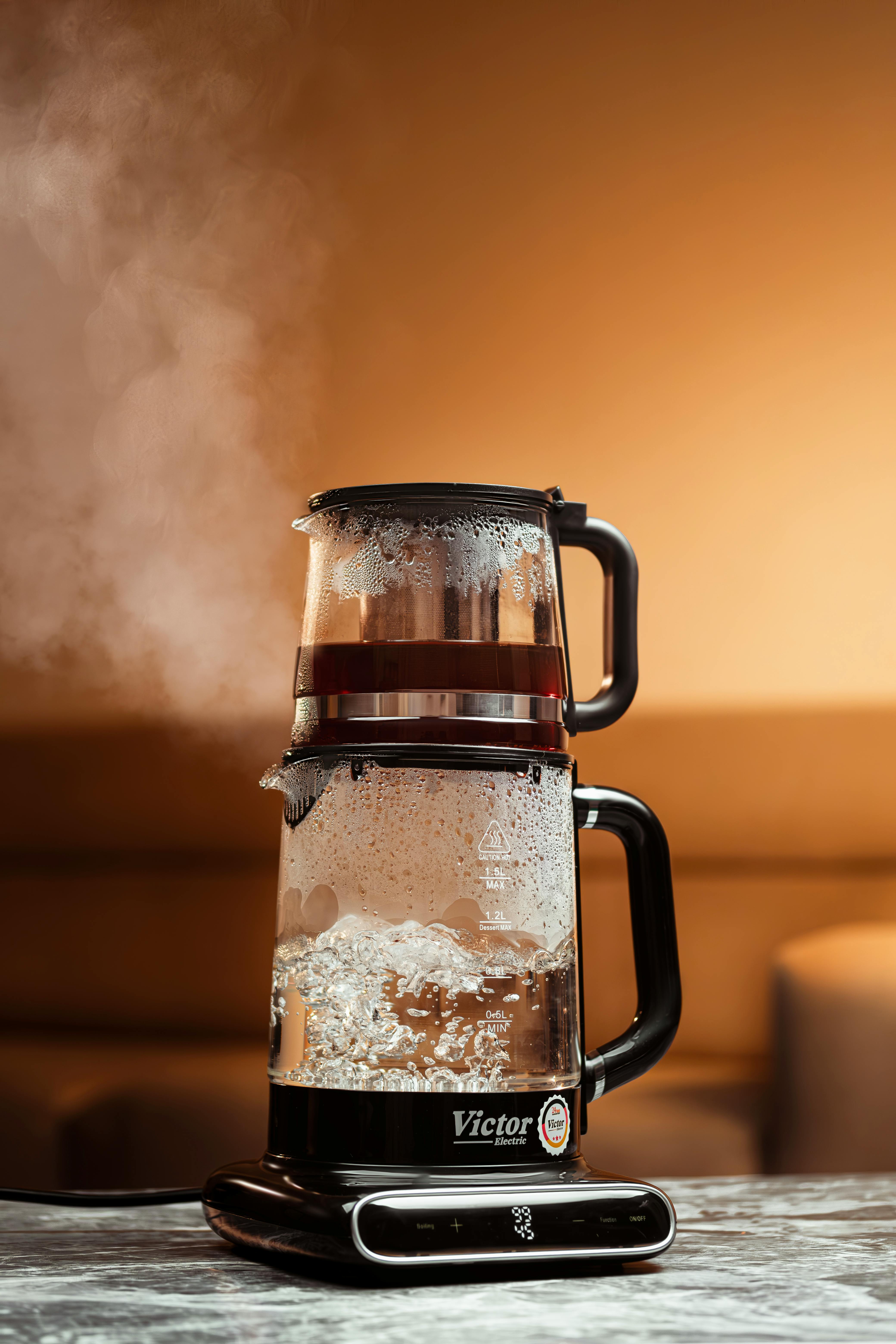 Modern Electric Kettle with Boiling Water · Free Stock Photo