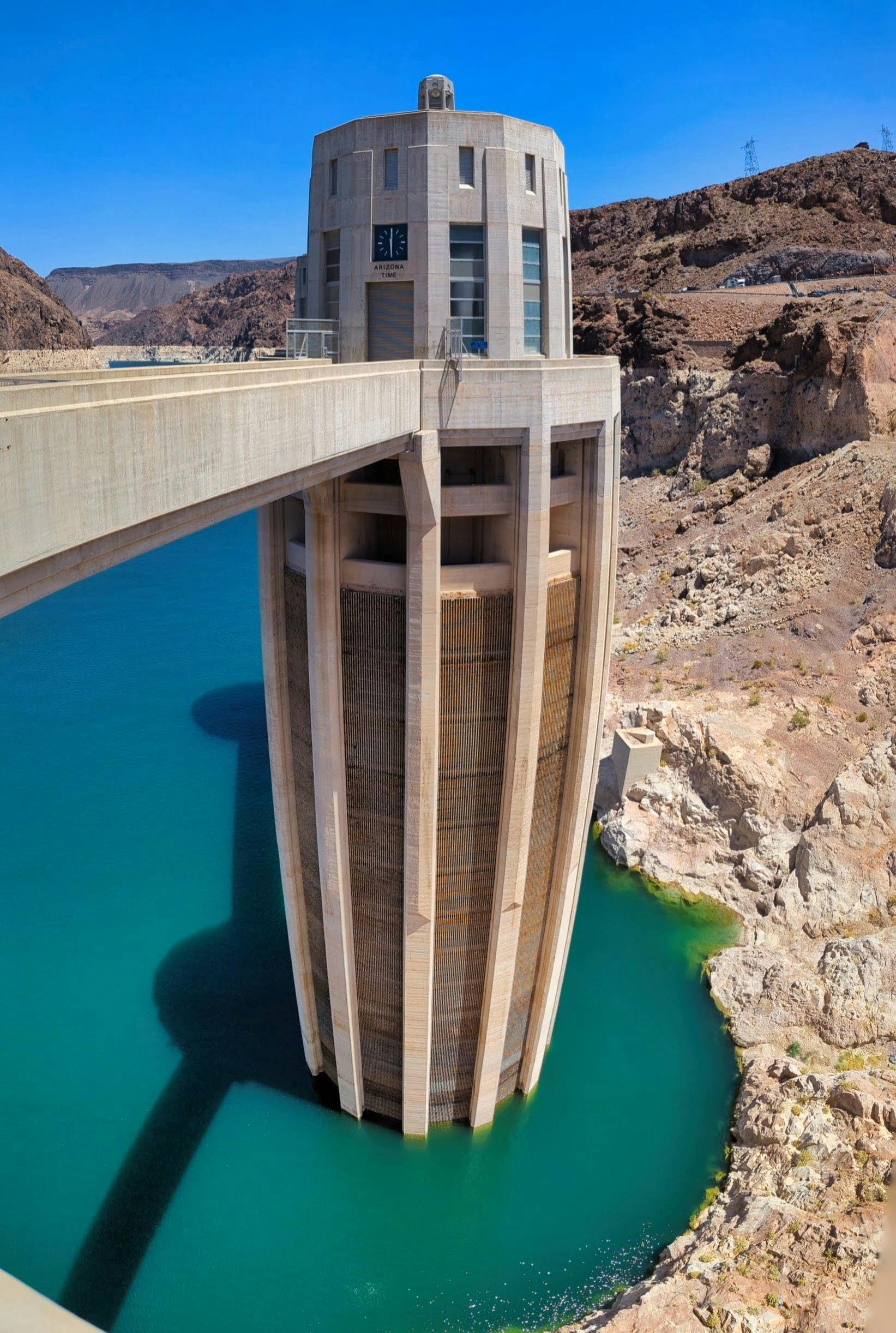 Hoover Dam Tower over Blue Lake Waters · Free Stock Photo