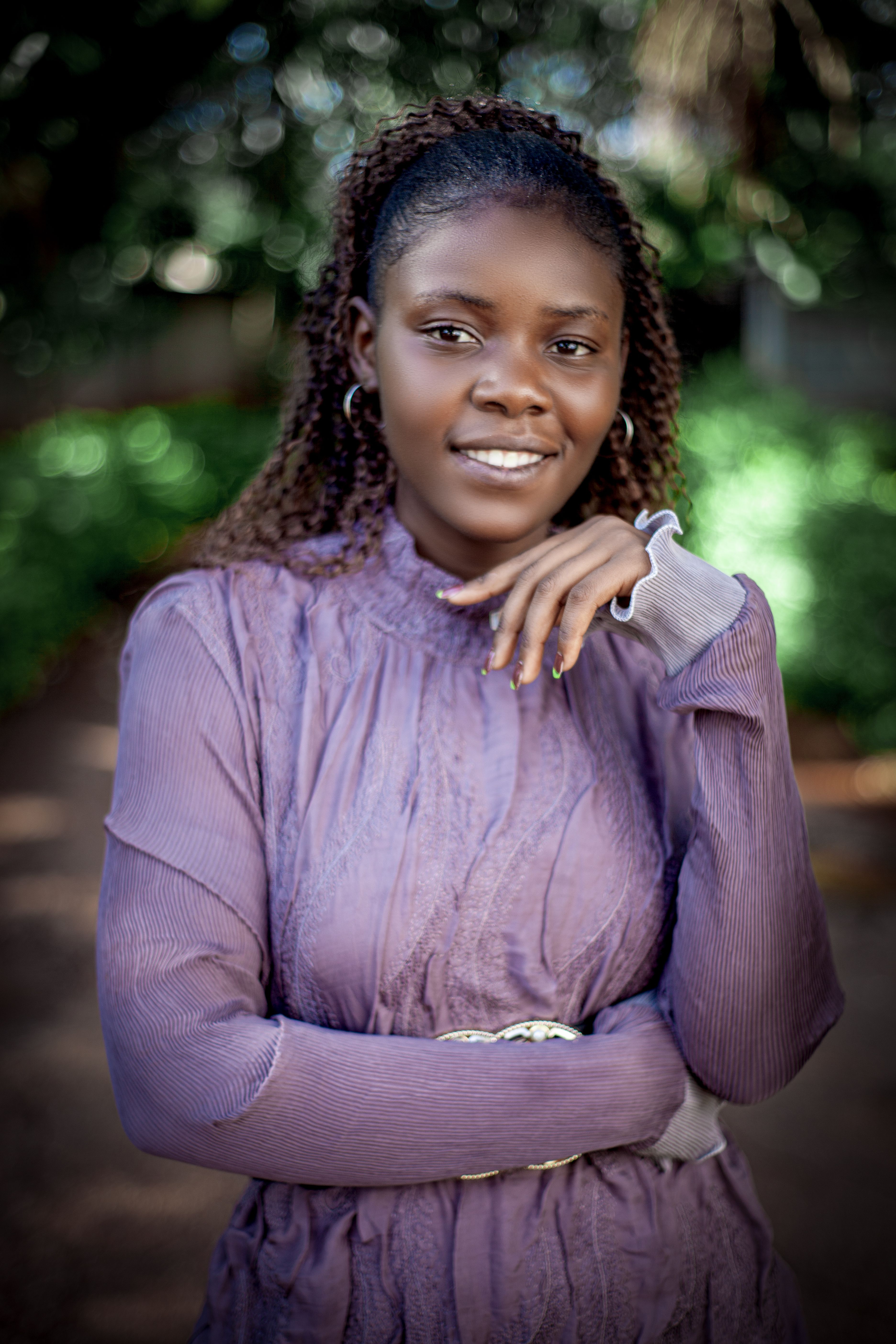 Portrait of a Smiling Woman in Harare Park · Free Stock Photo