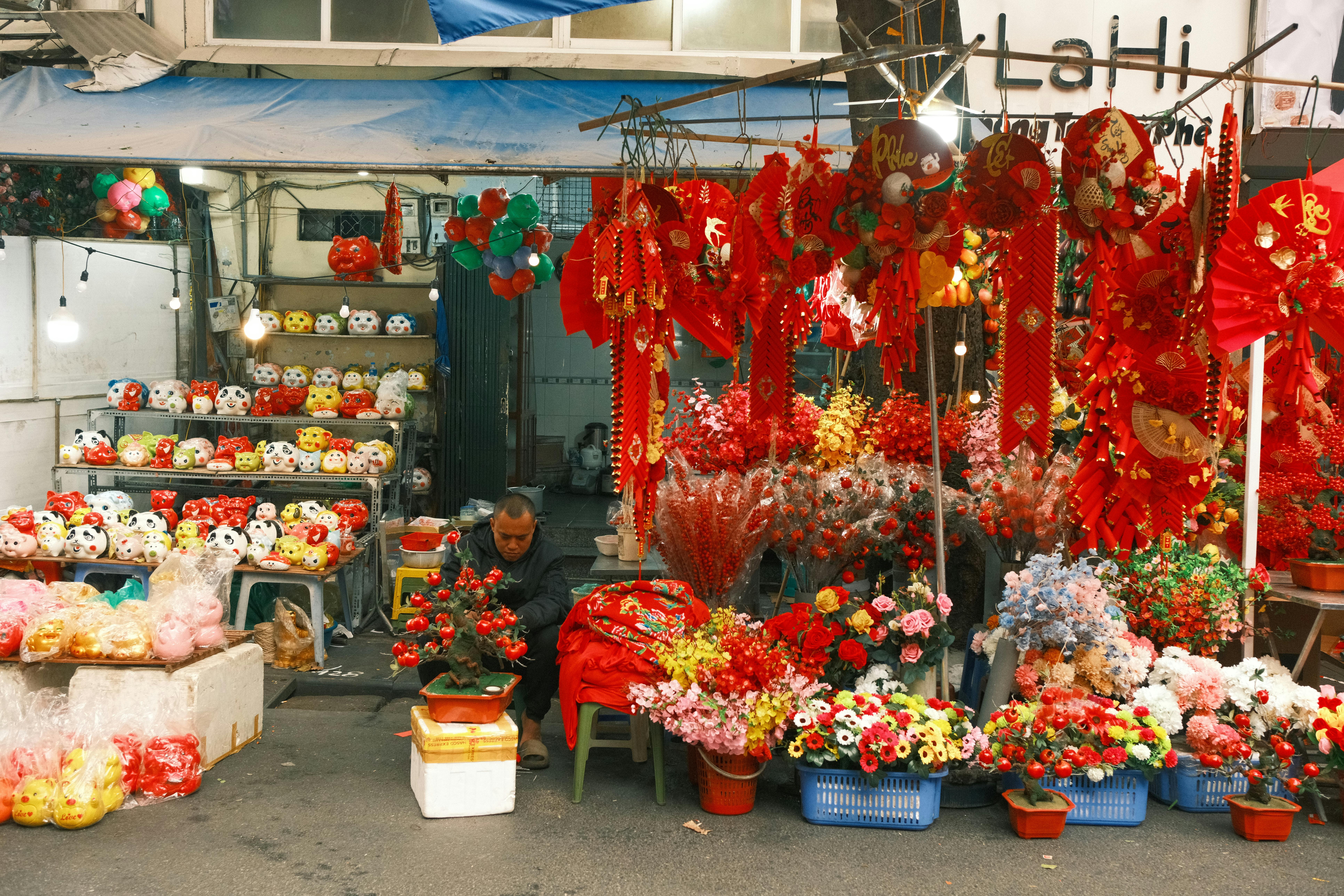 Vibrant Tet Festival Market in Hanoi Displaying Decorations · Free ...