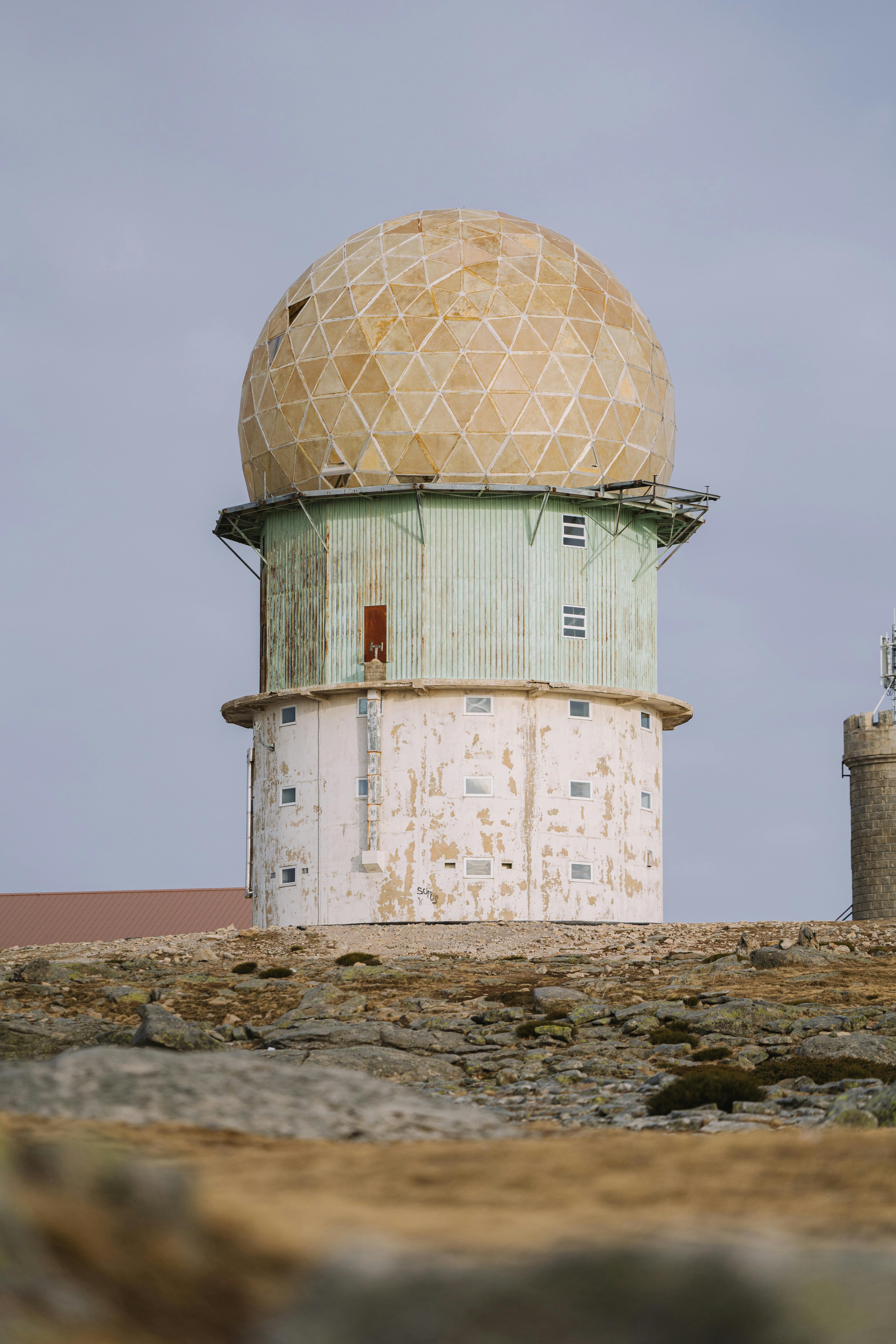 Old Radar Tower on Rocky Landscape · Free Stock Photo