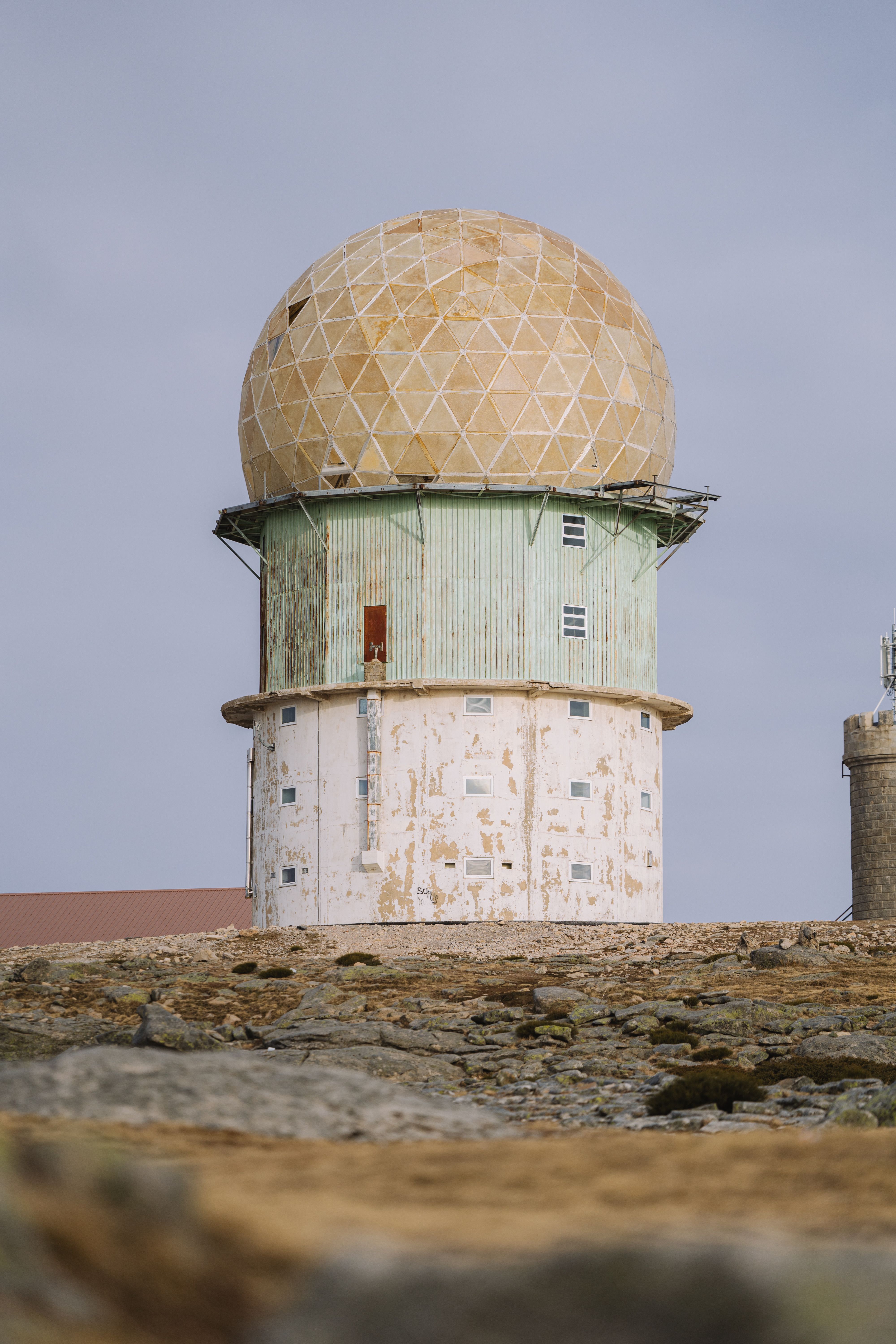 Old Radar Tower on Rocky Landscape · Free Stock Photo