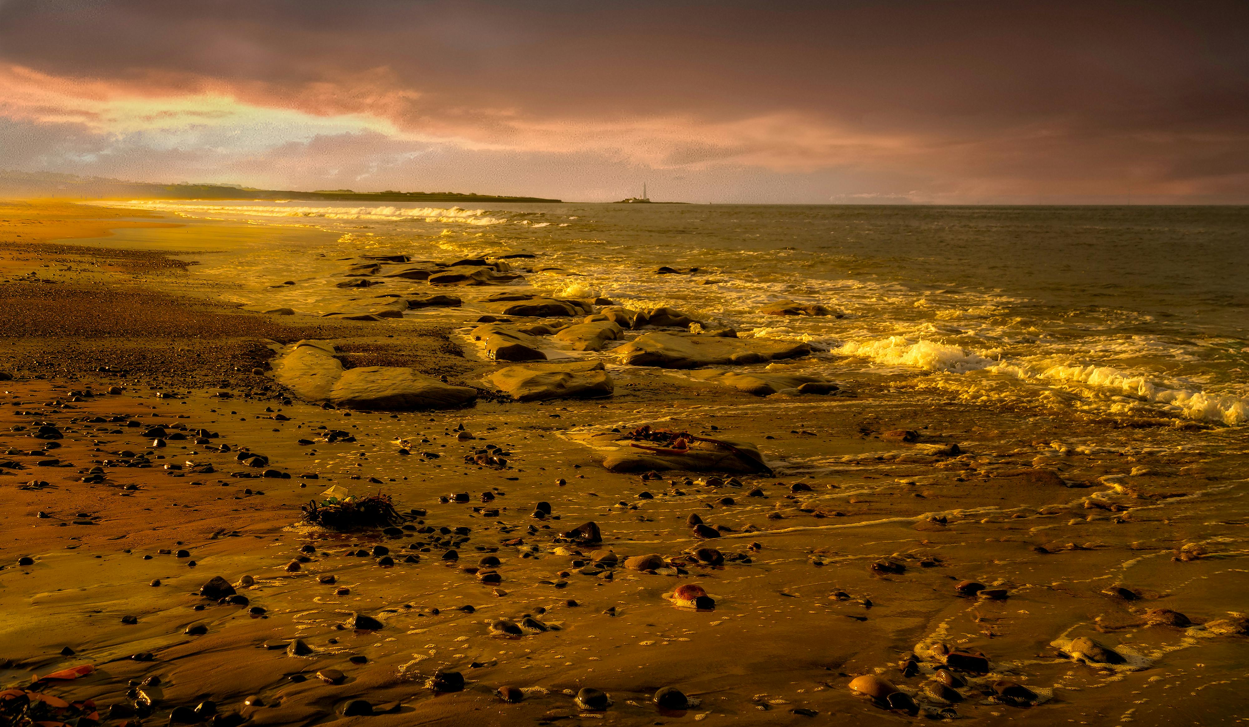 Golden Sunrise on Rocky Coastal Beach · Free Stock Photo