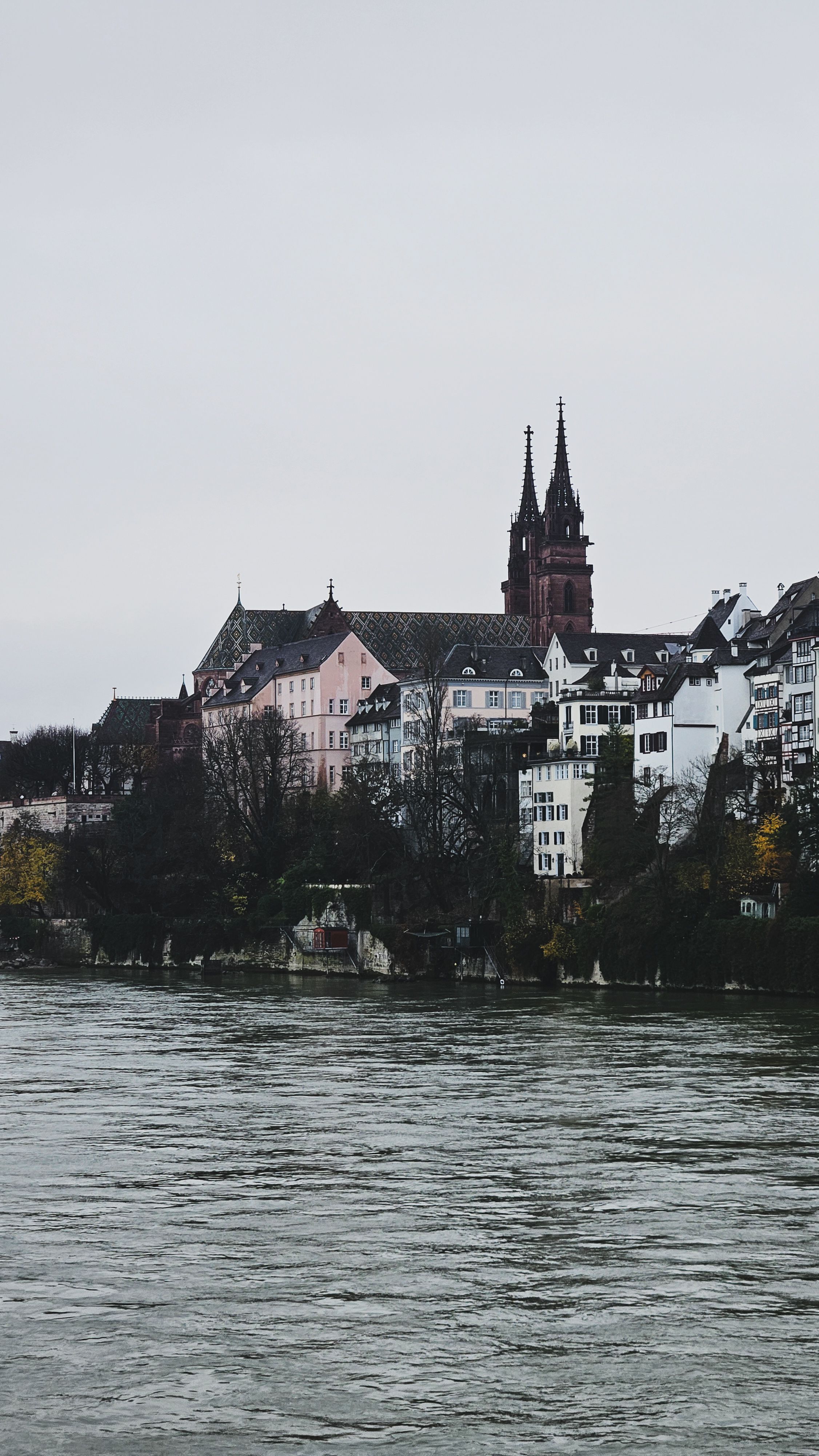 Scenic View of Basel Cathedral from Rhine River · Free Stock Photo