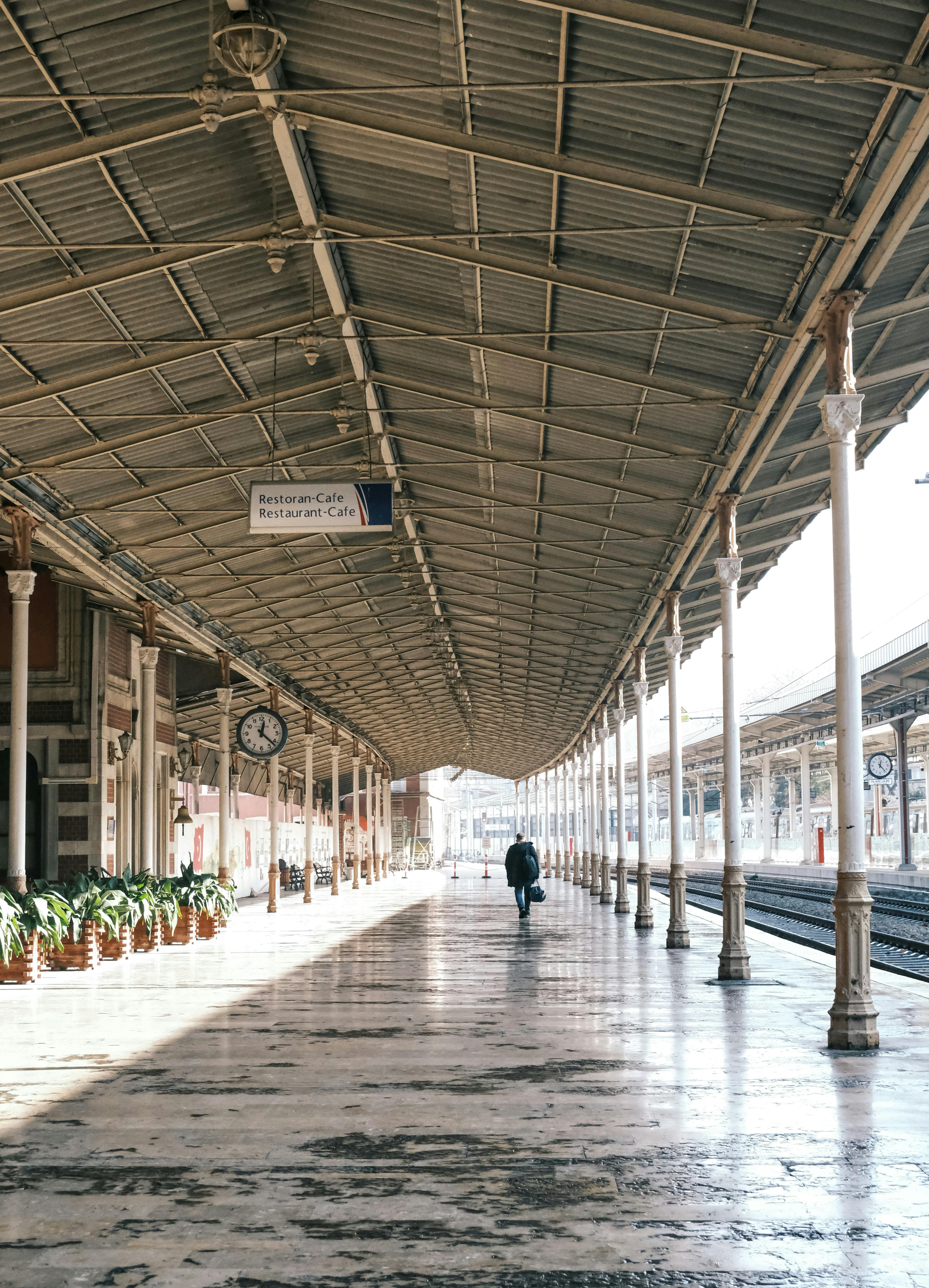 Wide Empty Train Platform with Lonely Figure · Free Stock Photo