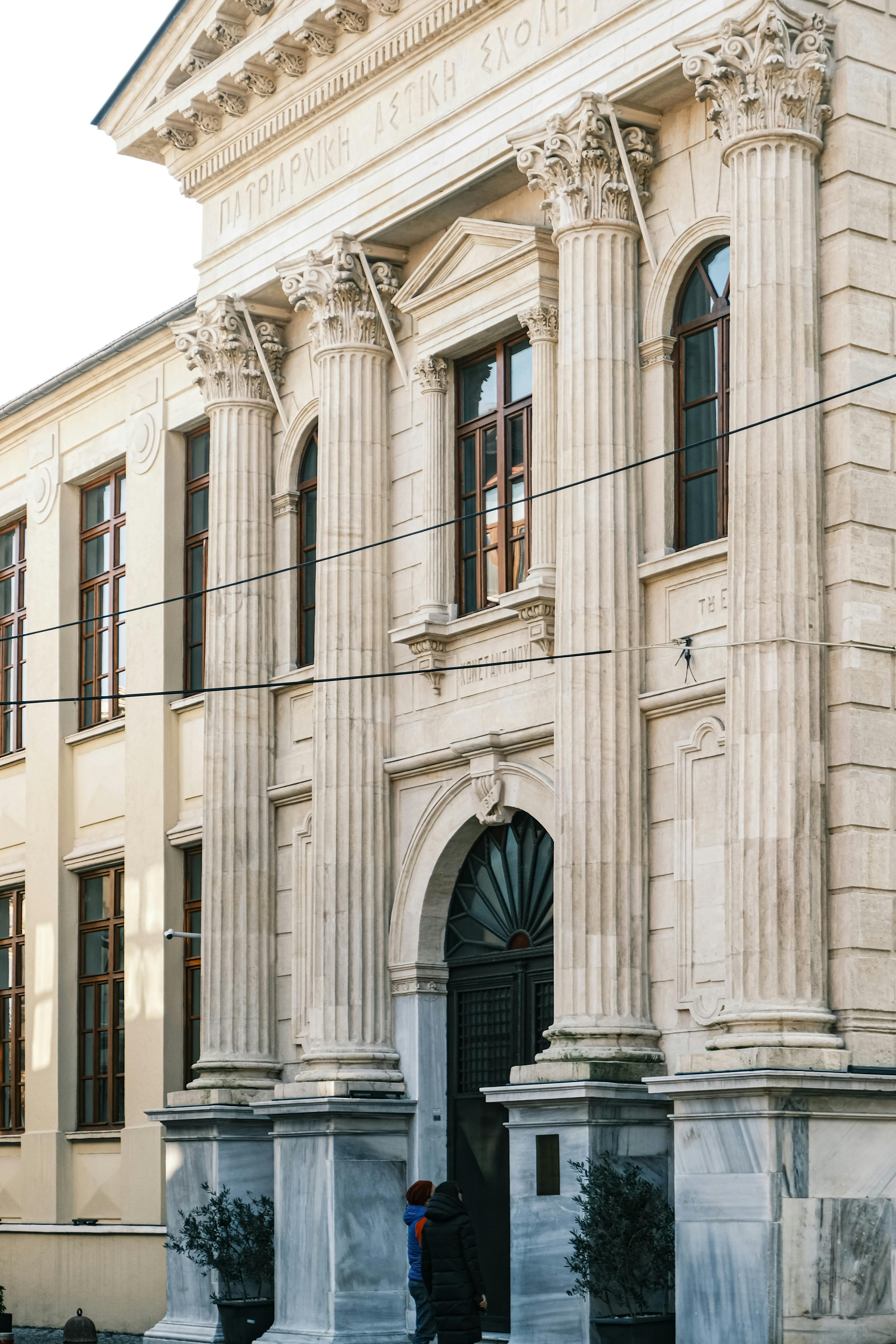 Historic Neoclassical Building Facade with Columns · Free Stock Photo