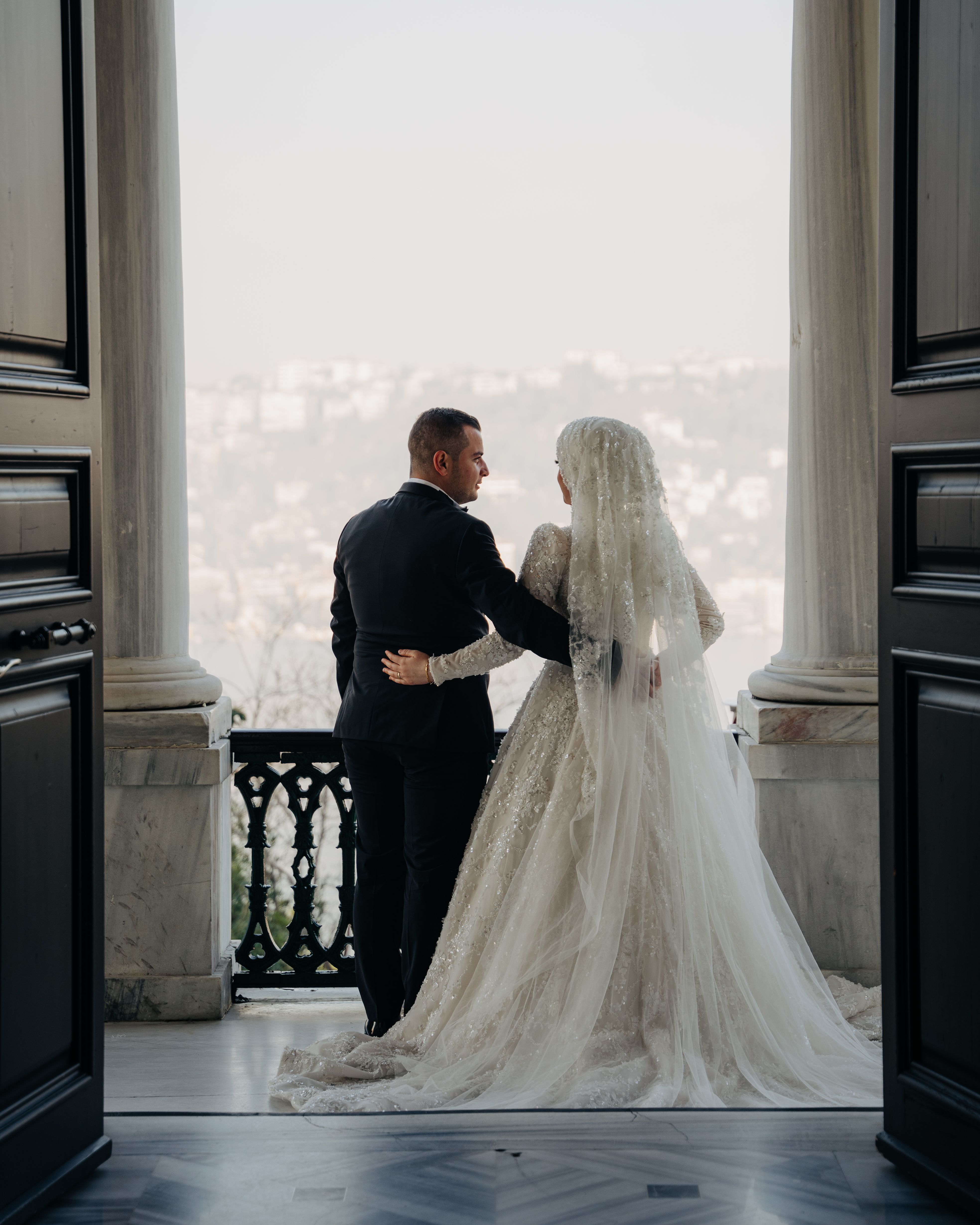 Elegant Wedding Couple Overlooking Scenic View · Free Stock Photo