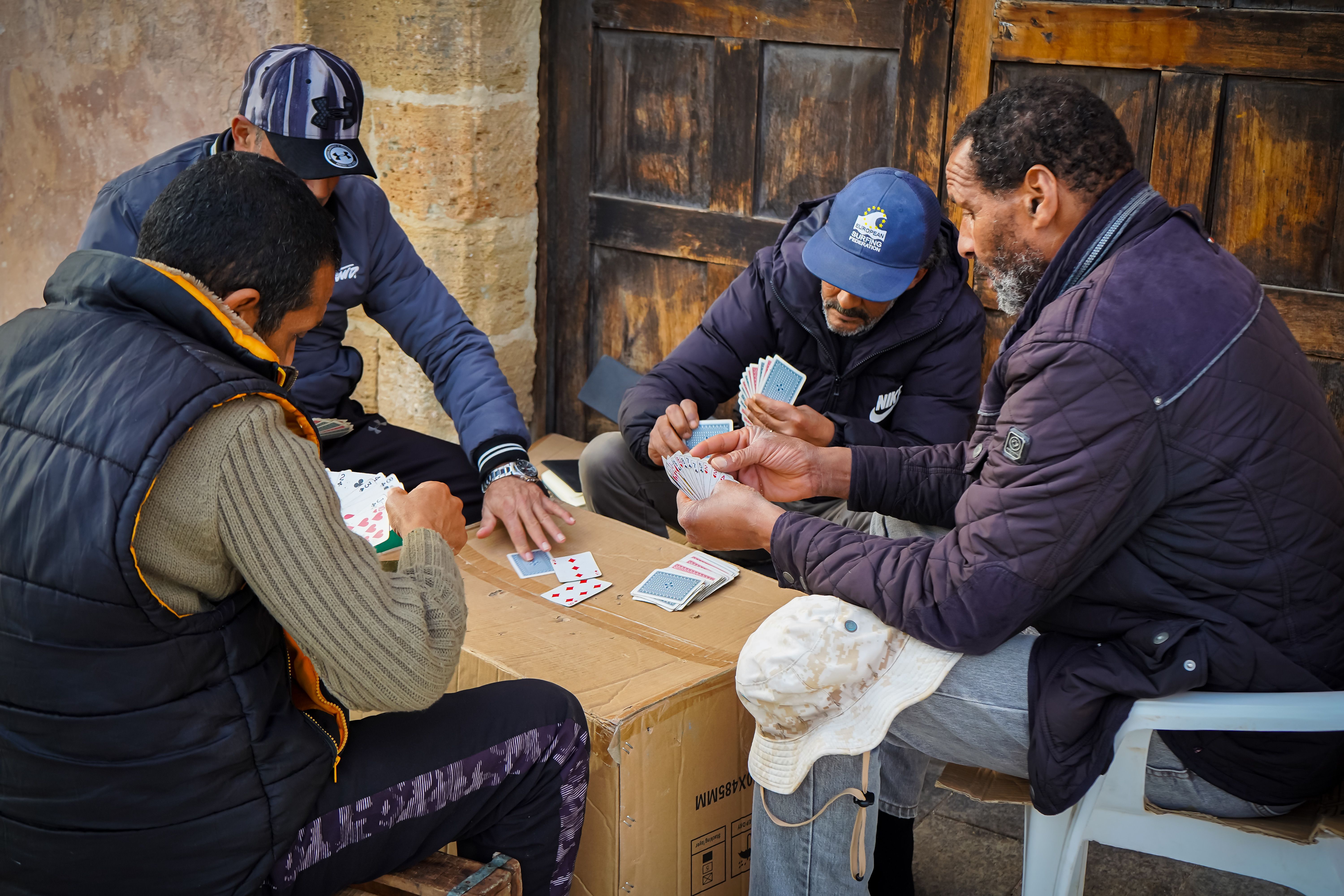 Men Playing Cards Outdoors in Rabat, Morocco · Free Stock Photo