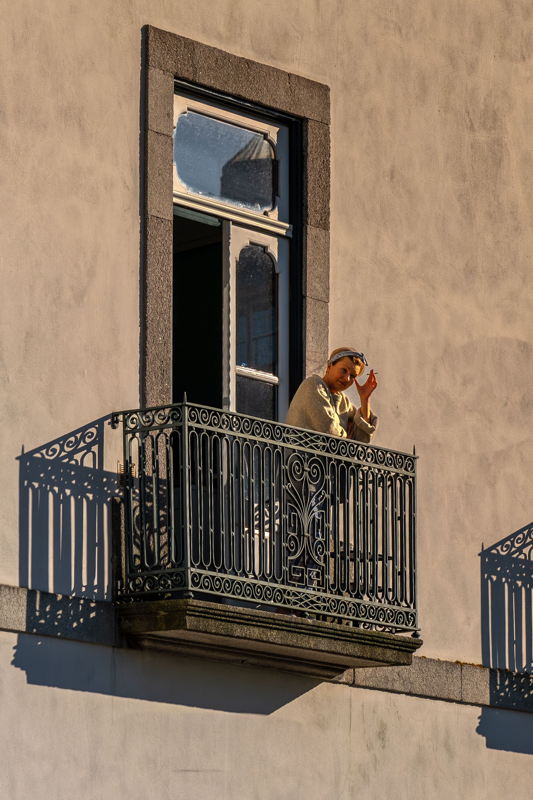 Person on Balcony in Oporto, Portugal · Free Stock Photo