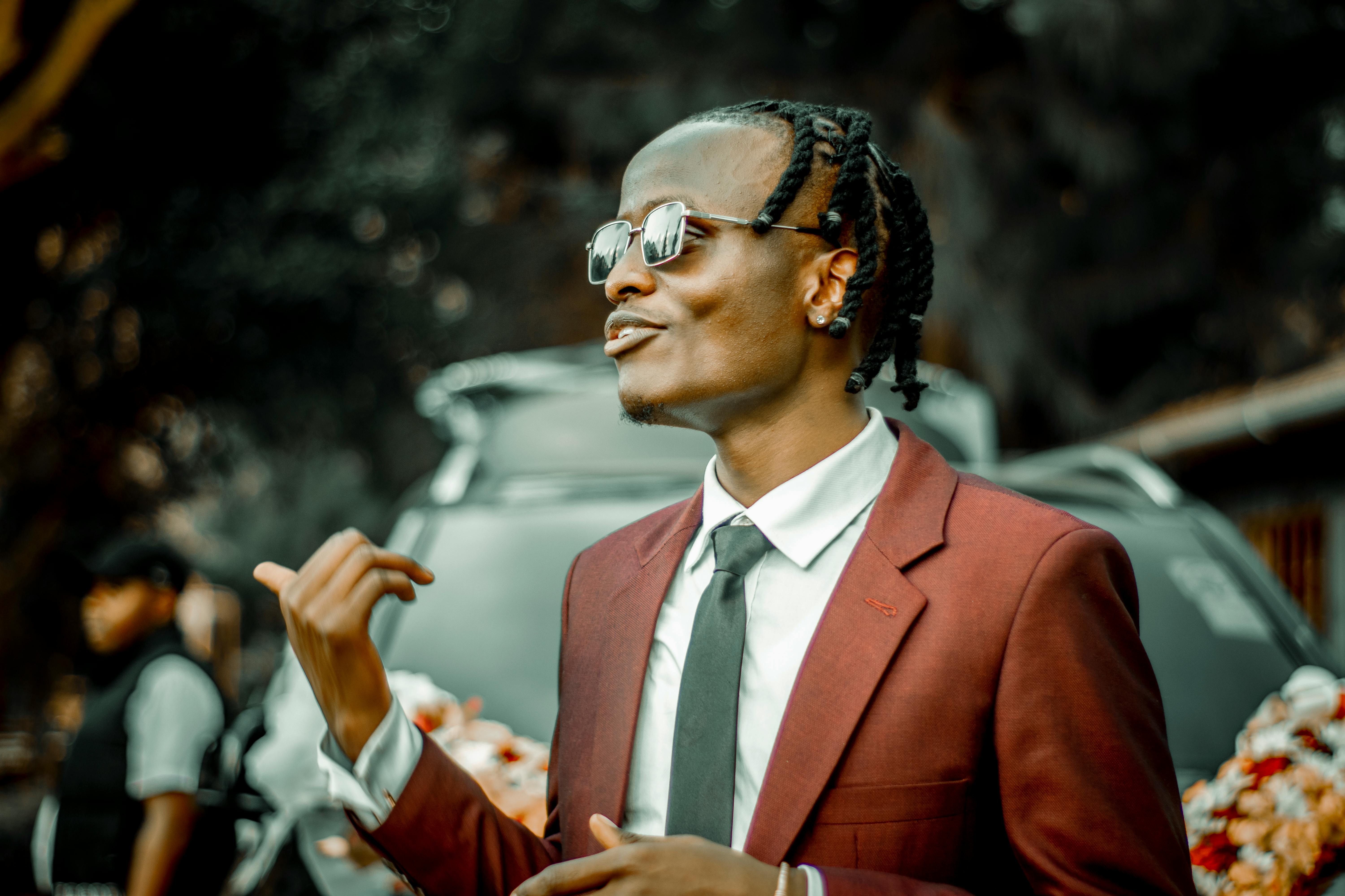 Stylish Man in Suit at Outdoor Event in Nairobi · Free Stock Photo