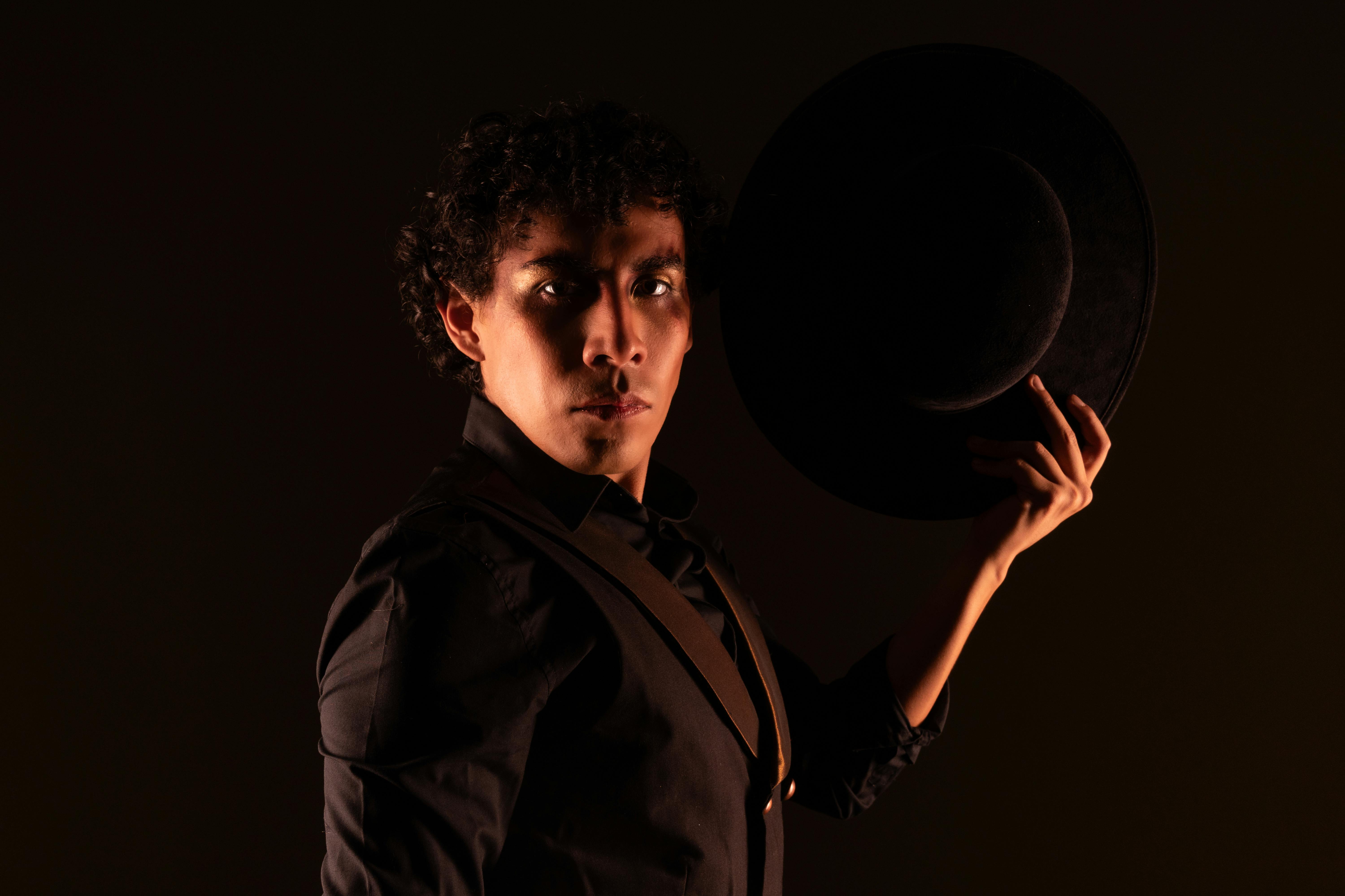 Artistic Male Dancer in Elegant Mocha Setting · Free Stock Photo