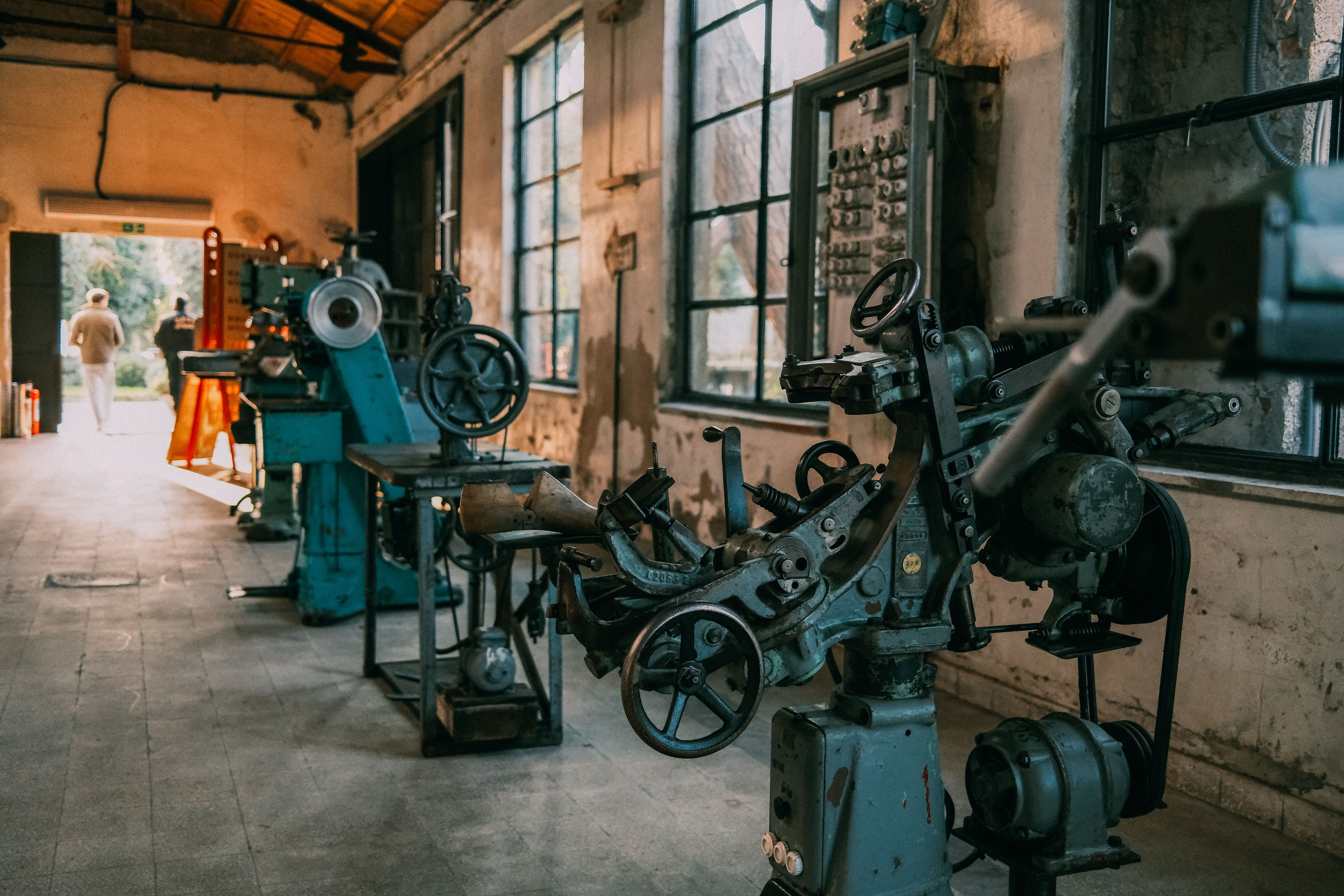 Vintage Industrial Workshop with Machinery · Free Stock Photo