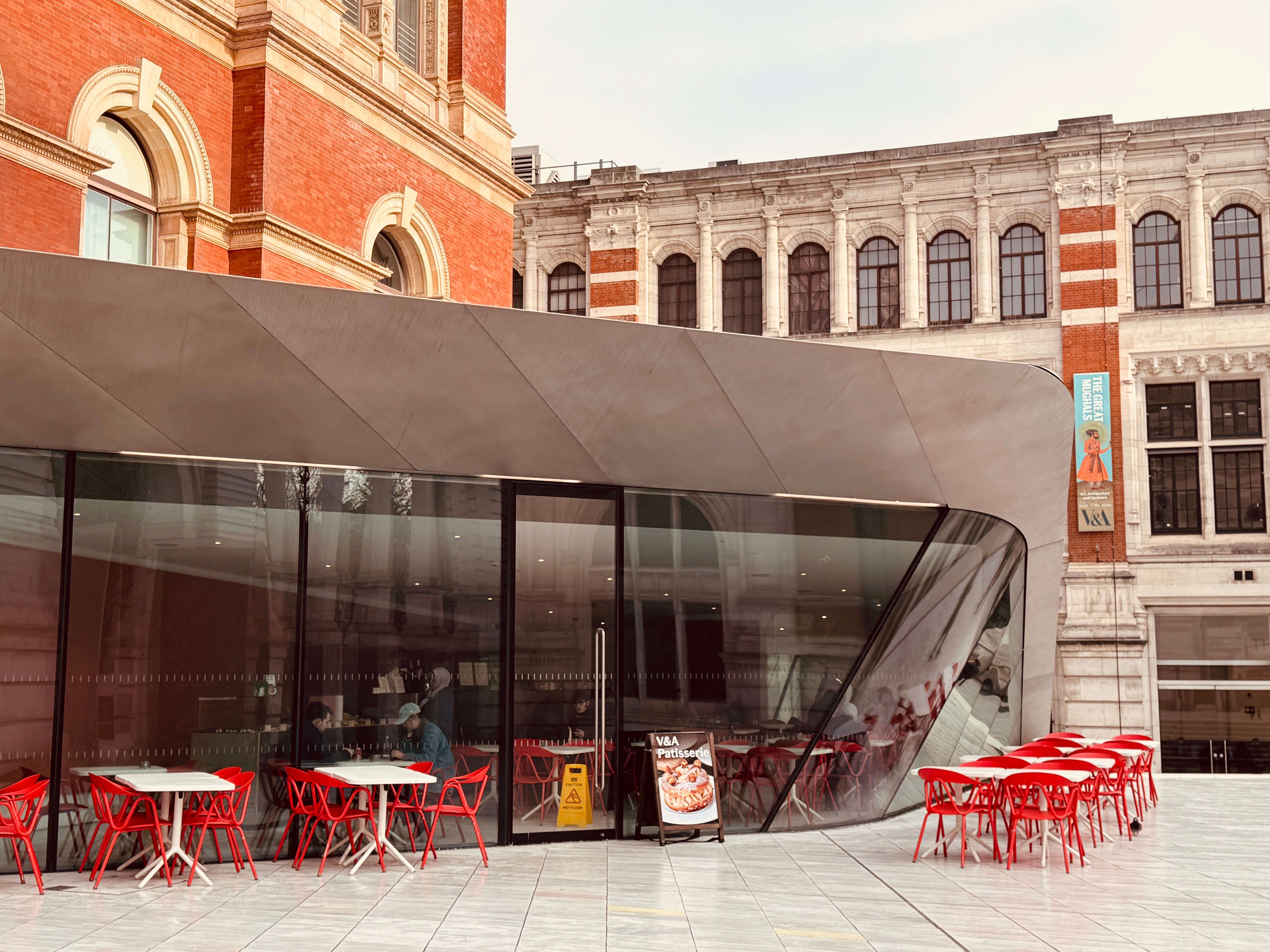 Modern Cafe Exterior at Historic Building · Free Stock Photo
