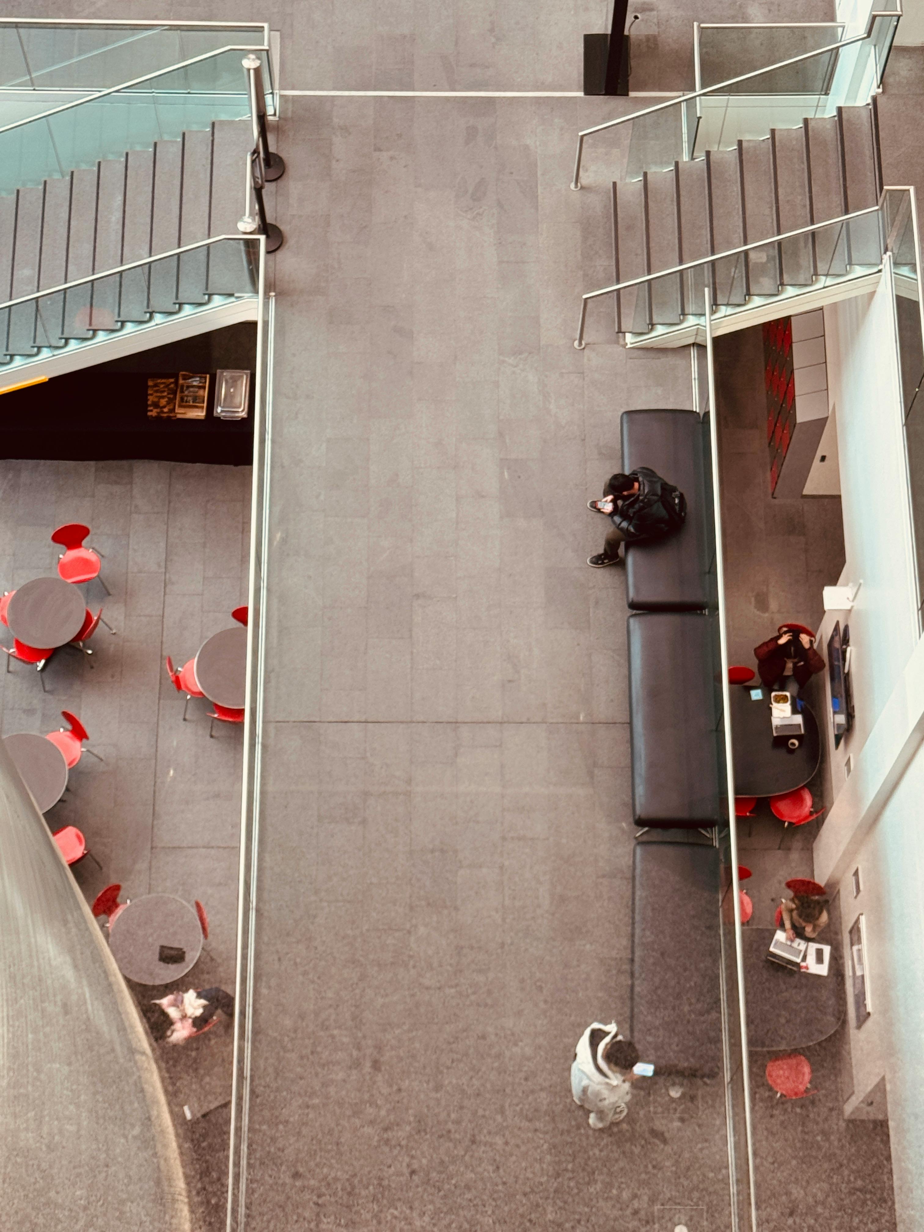 Modern Atrium with Red Accents - Aerial View · Free Stock Photo