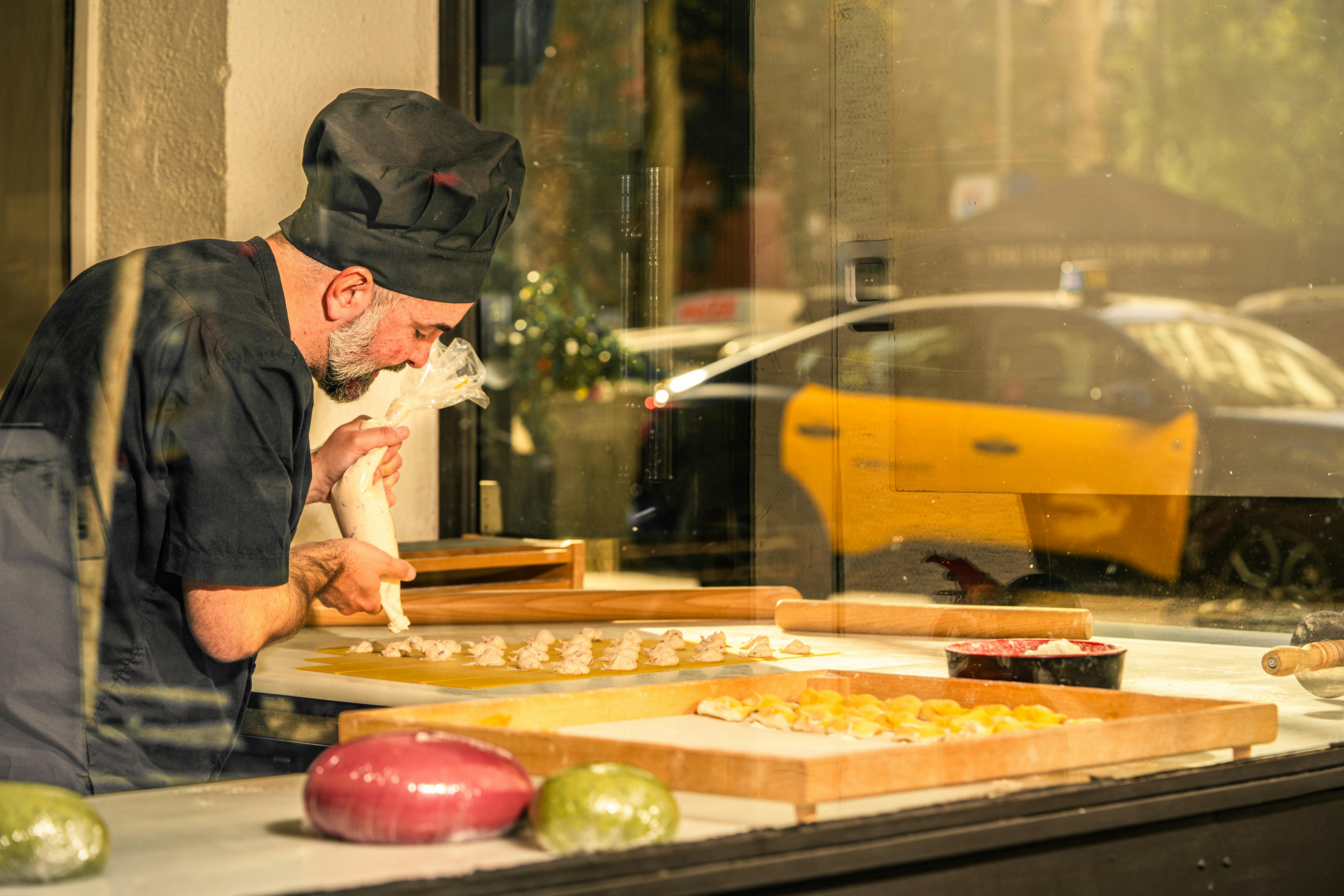 Chef Preparing Fresh Pasta in Restaurant Kitchen · Free Stock Photo