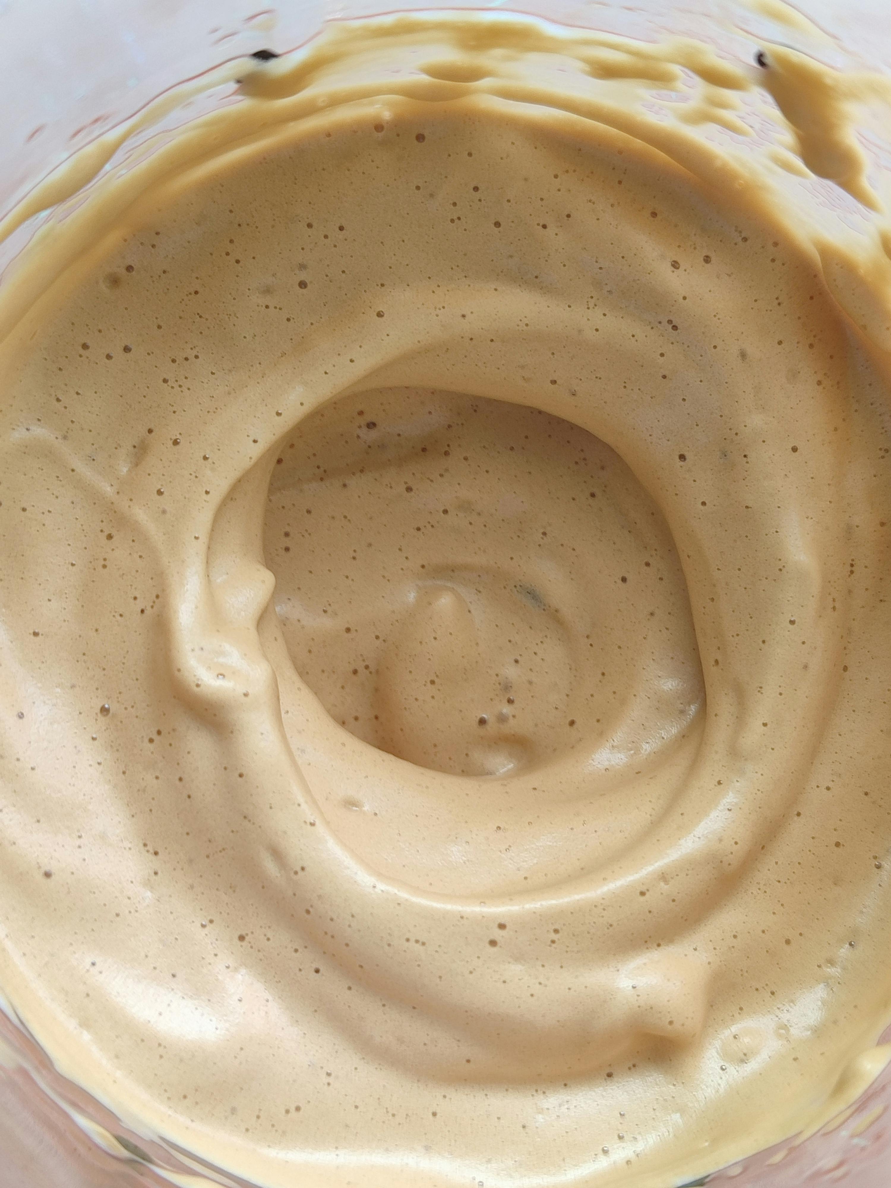 Close-up of creamy coffee foam texture · Free Stock Photo