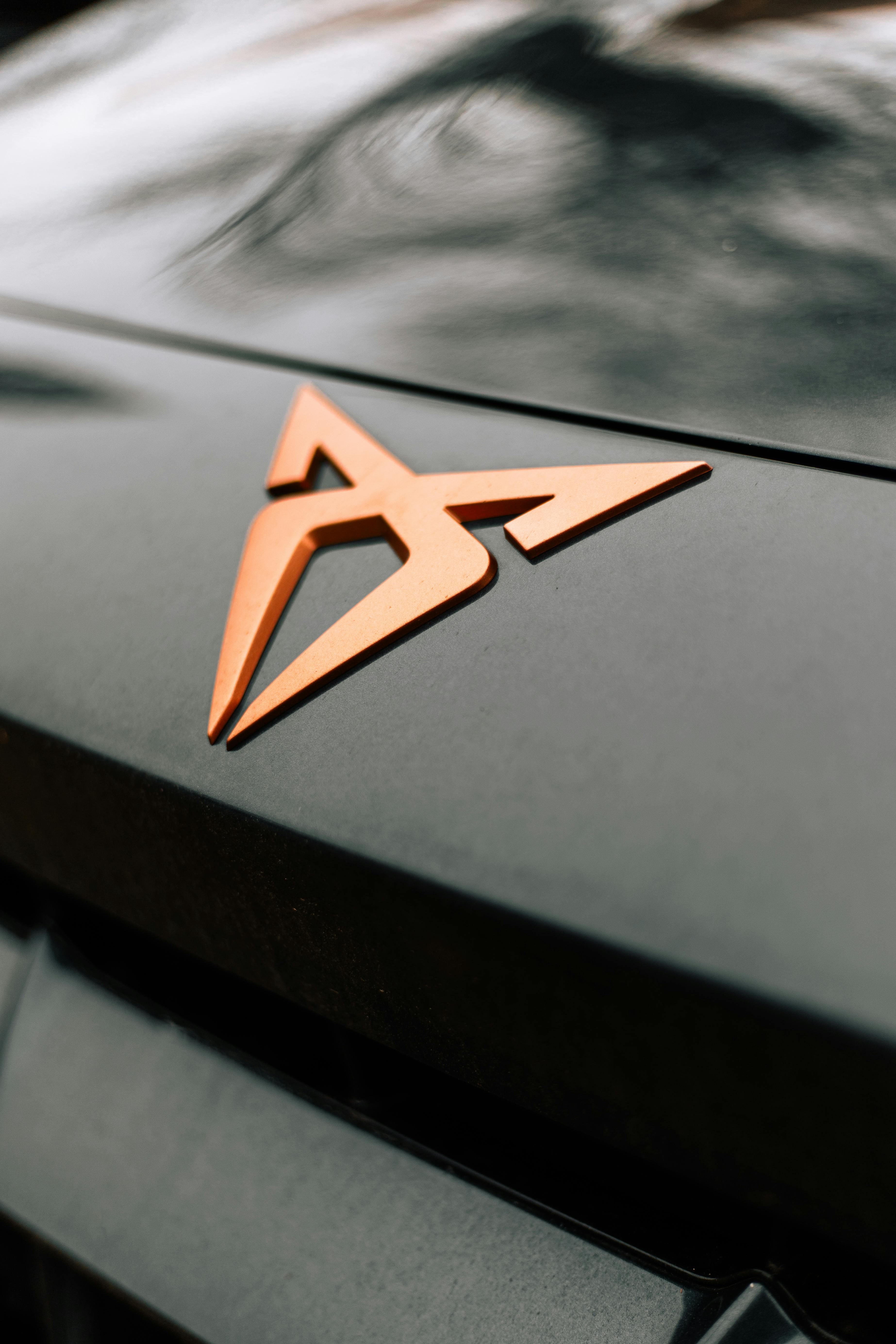 Close-up of Modern Car Emblem on Vehicle Exterior · Free Stock Photo