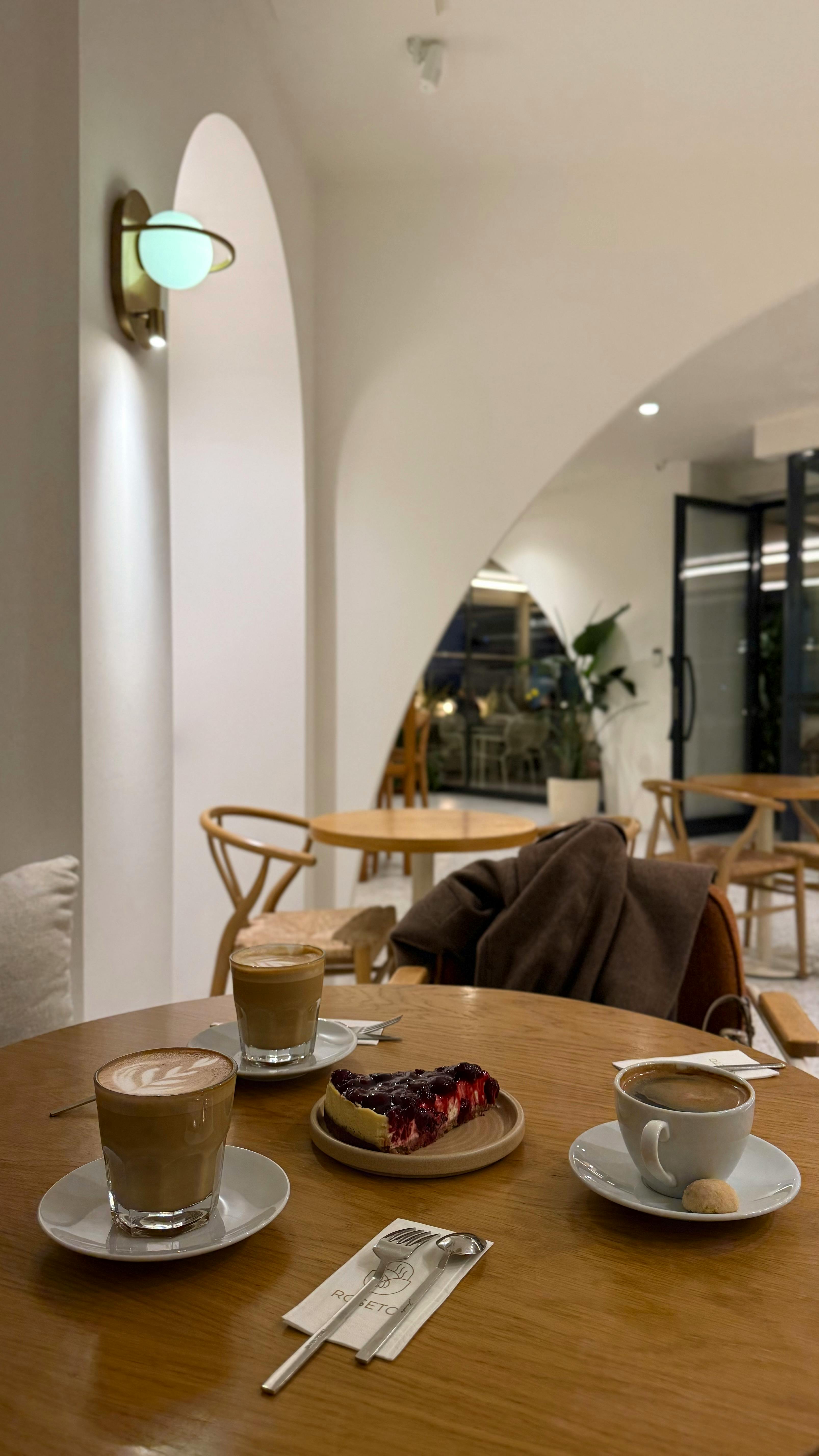 Cozy cafe with drinks and dessert setup · Free Stock Photo