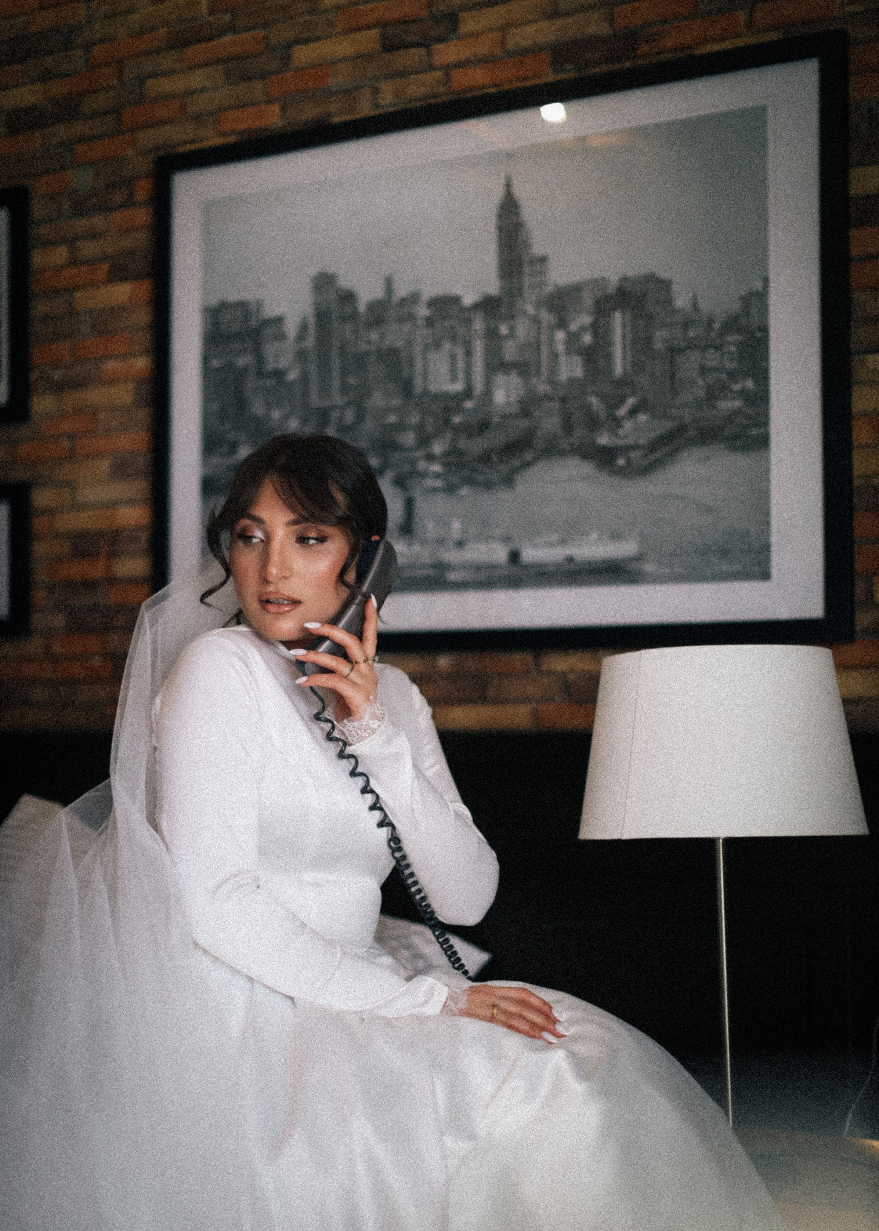 Elegant Bride Talking on Phone in Hotel Room · Free Stock Photo