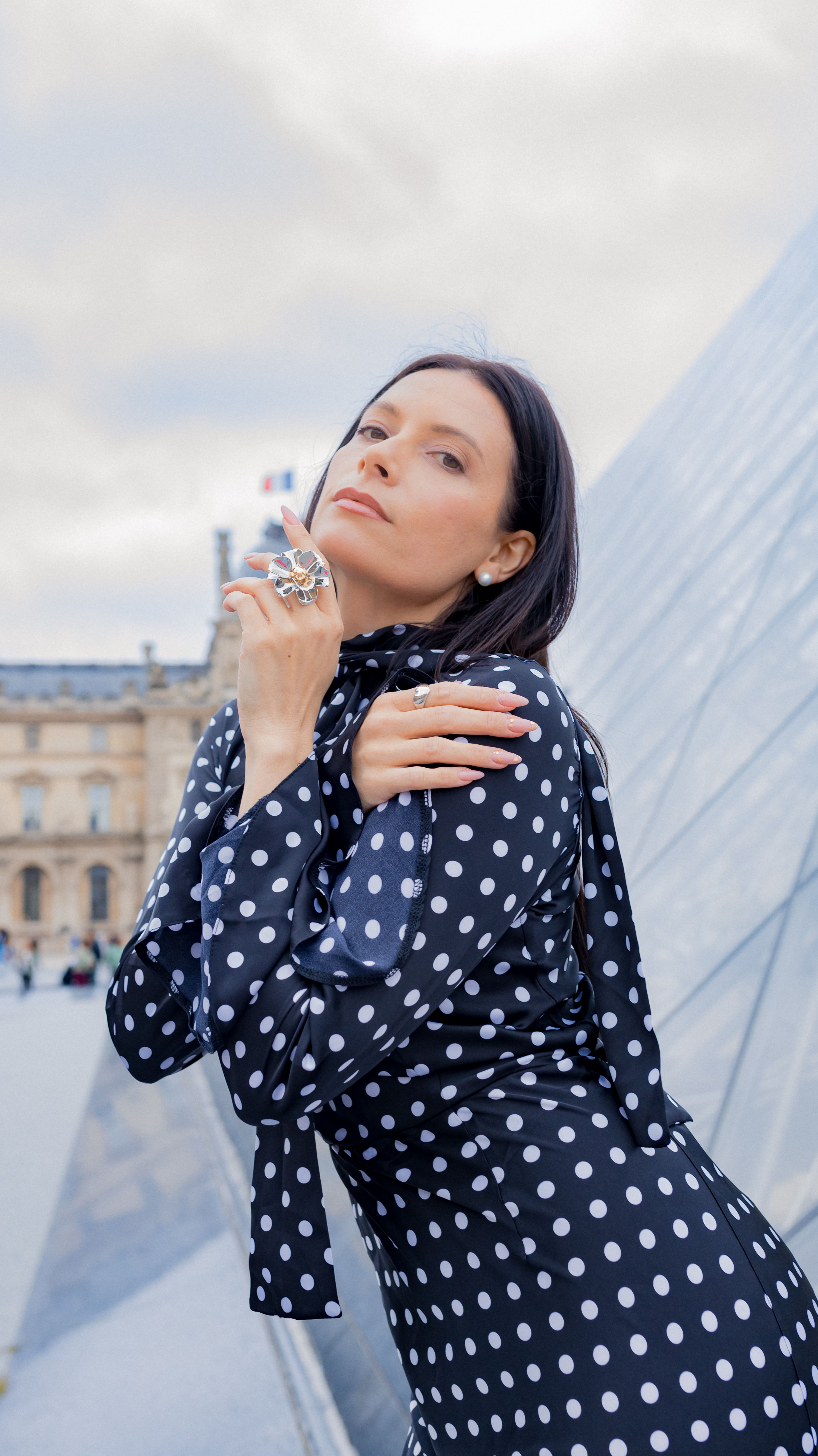 Fashion Model Posing at Louvre Pyramid in Paris · Free Stock Photo