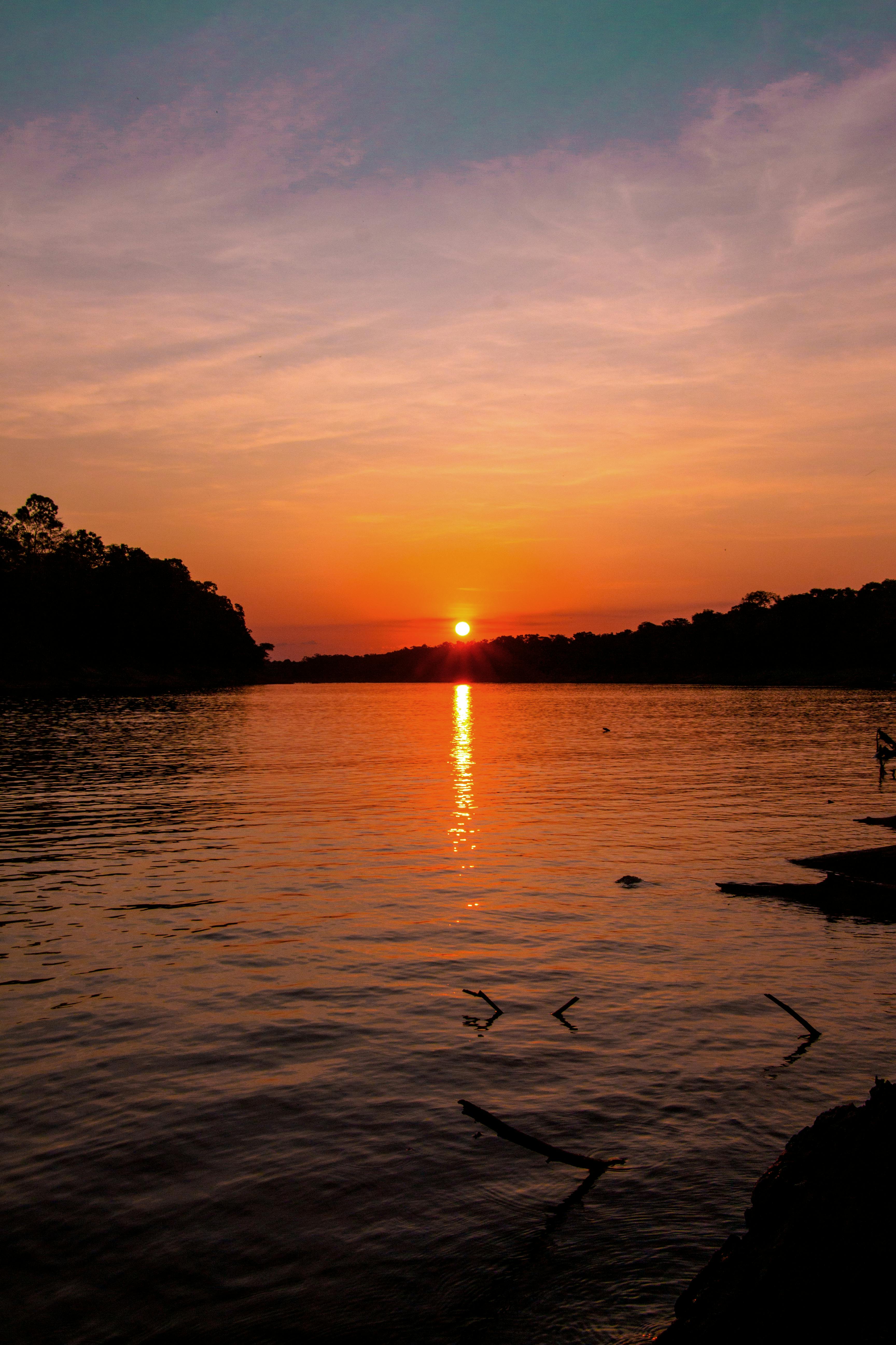 Stunning Sunset Over the Amazon River · Free Stock Photo