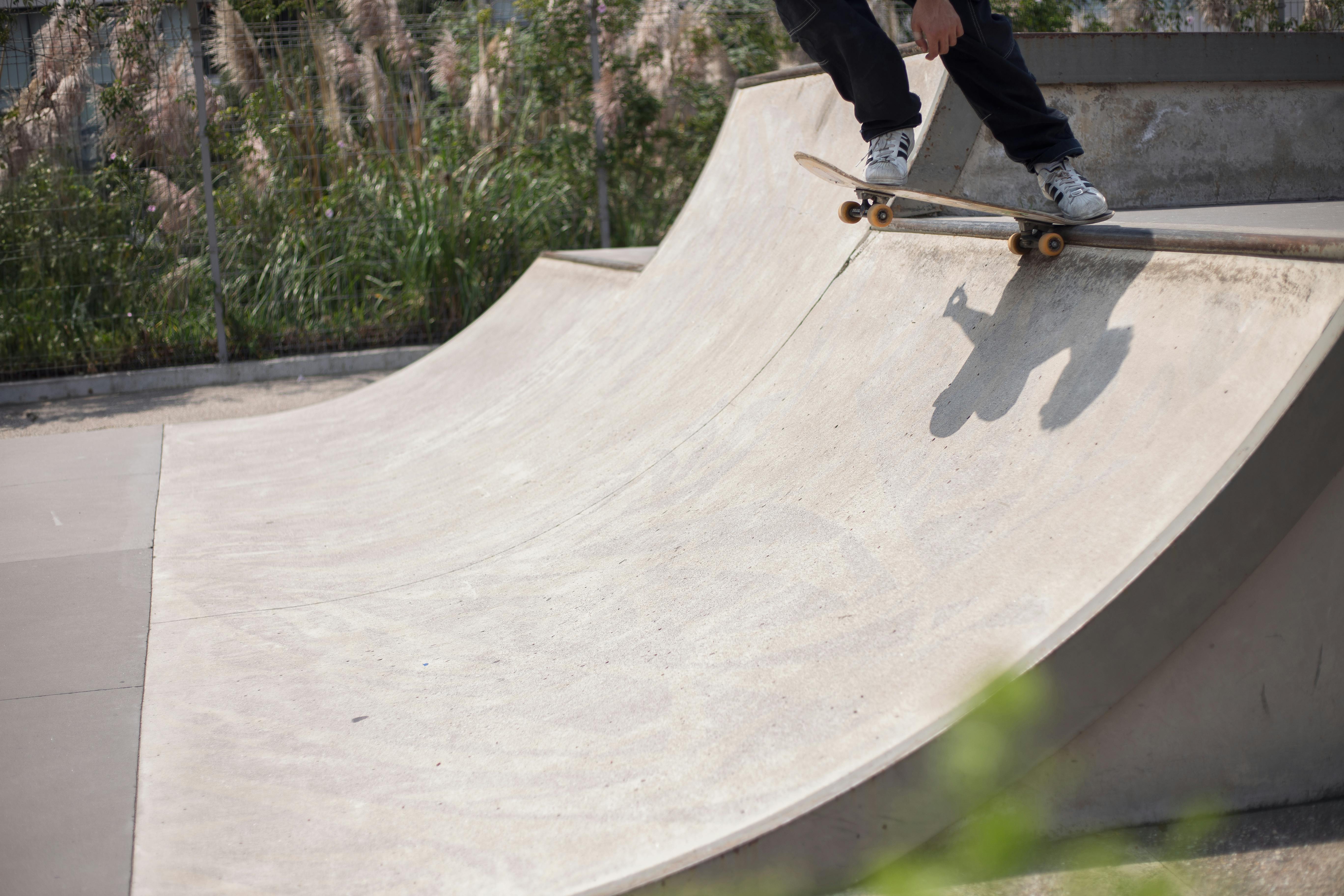 Skateboarder Balancing on Top of Ramp · Free Stock Photo