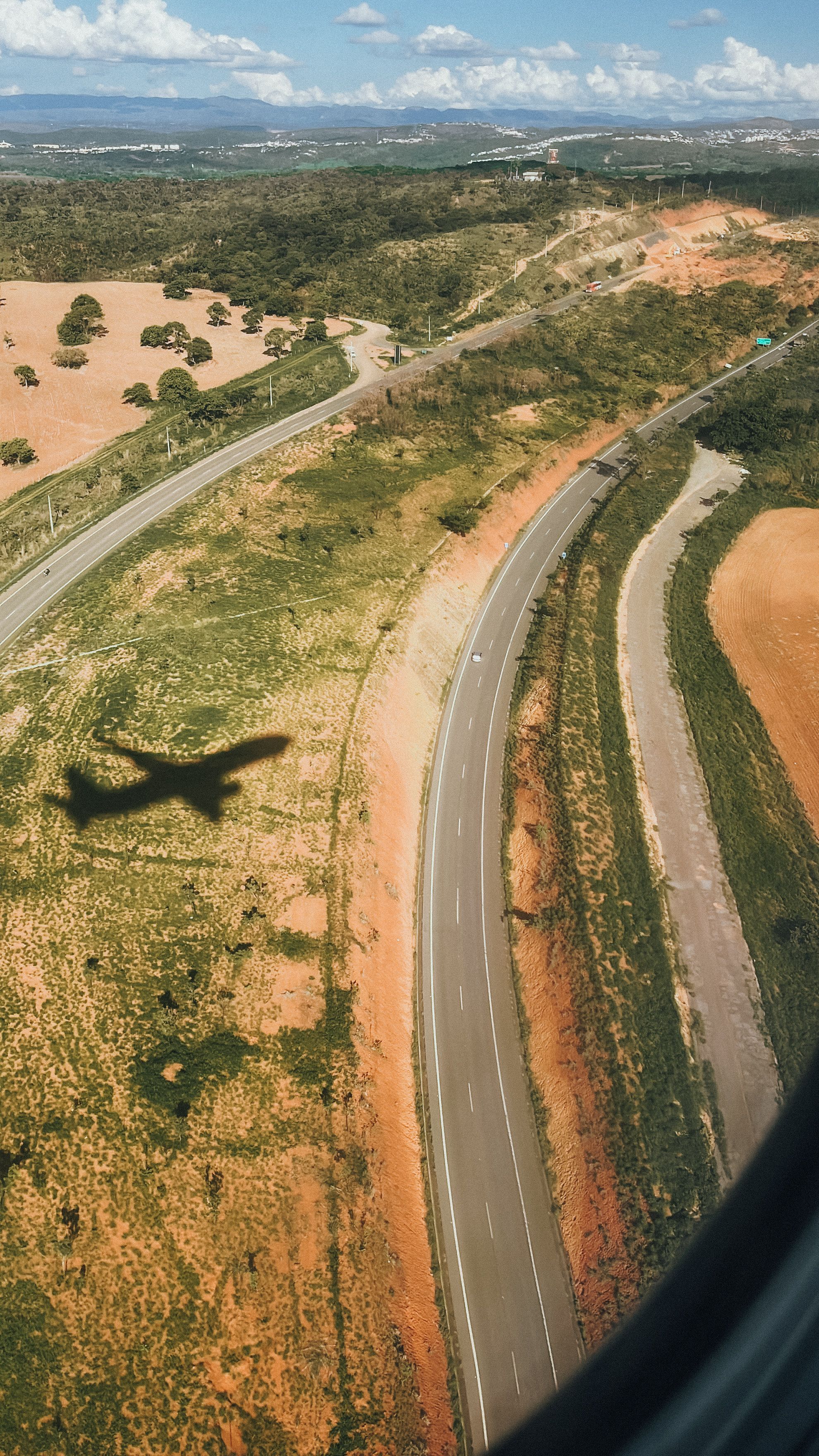 Aerial View of Countryside with Airplane Shadow · Free Stock Photo