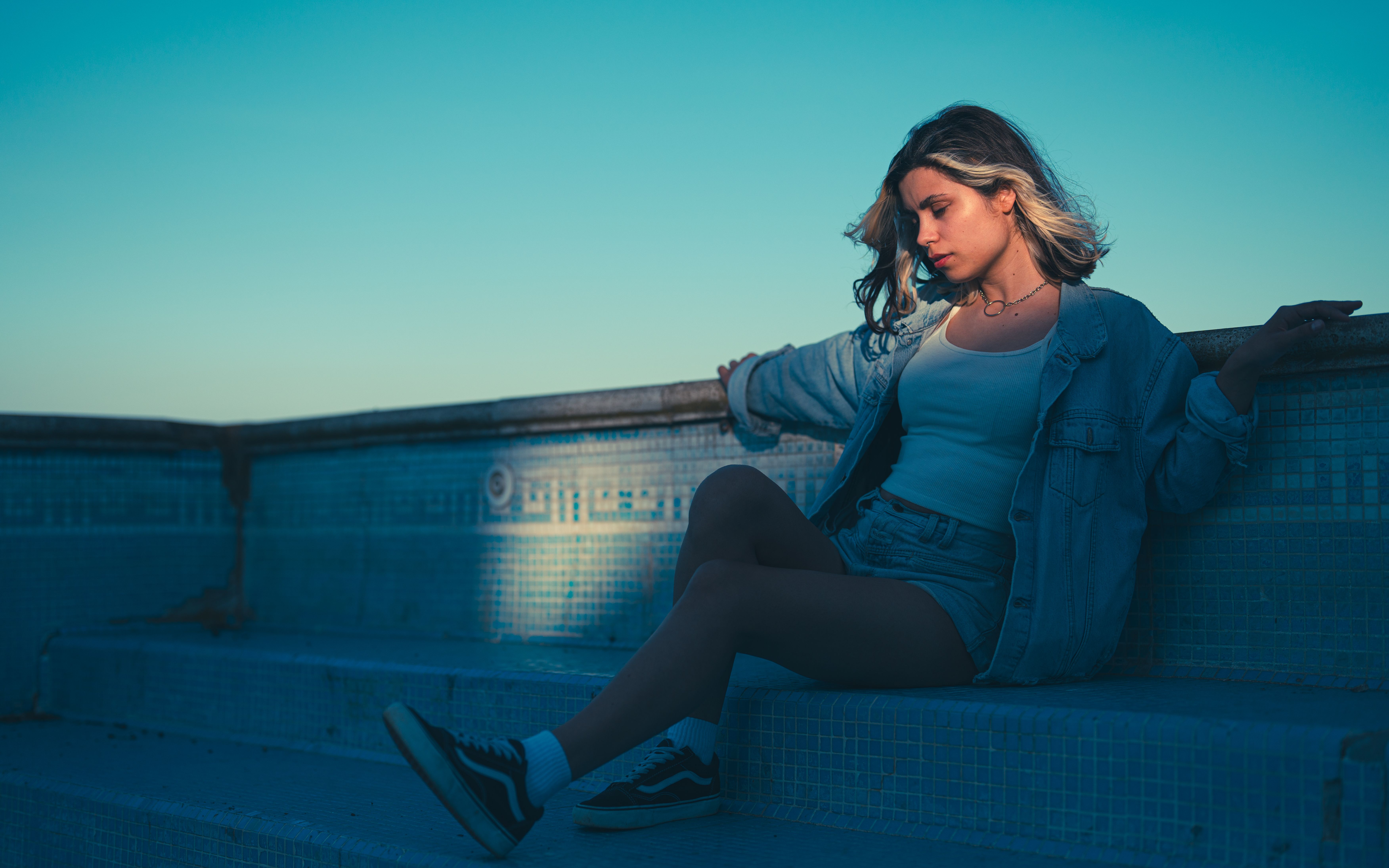 Young Woman Posing in Empty Pool at Twilight · Free Stock Photo