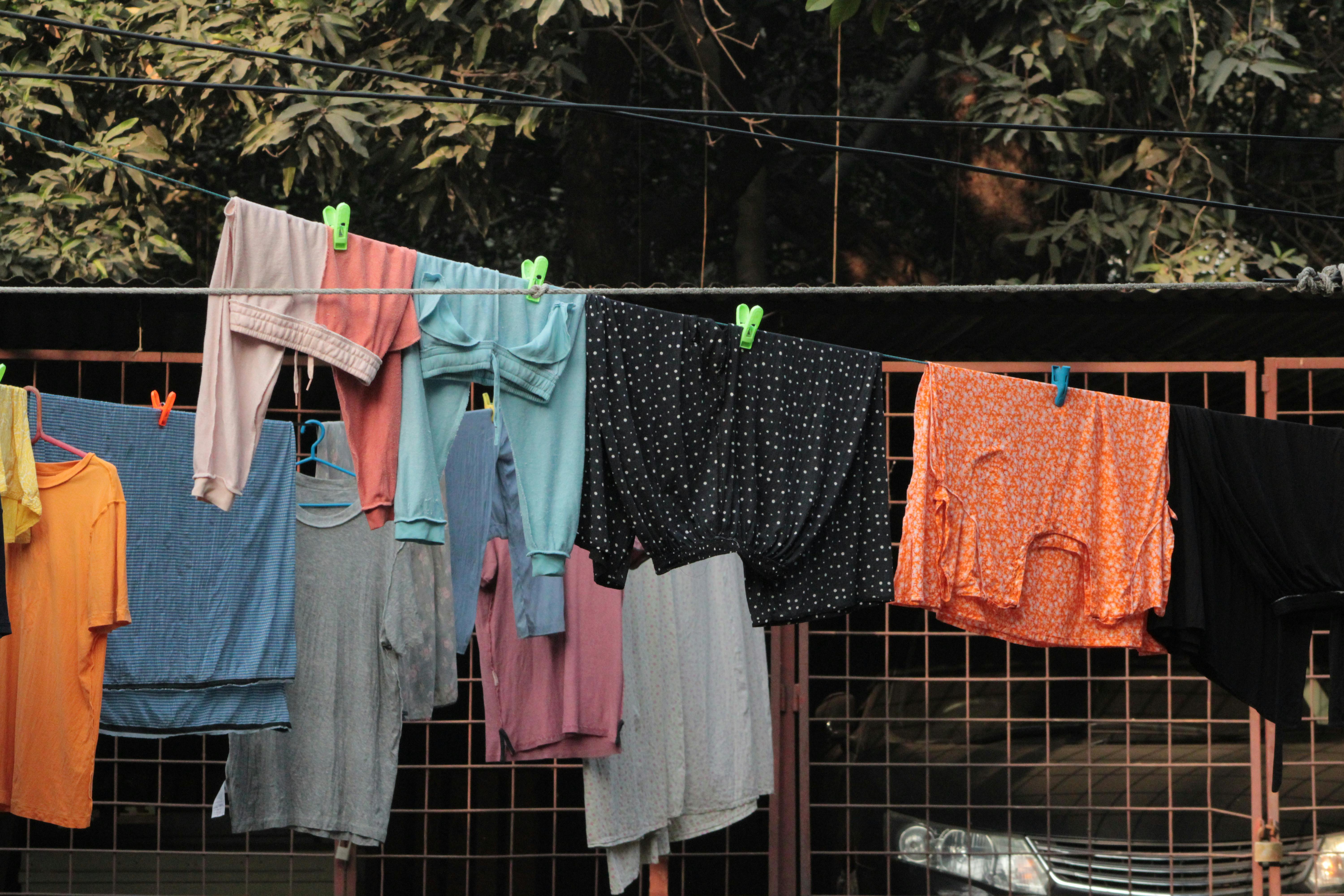 Colorful Clothes Drying on Outdoor Clothesline · Free Stock Photo