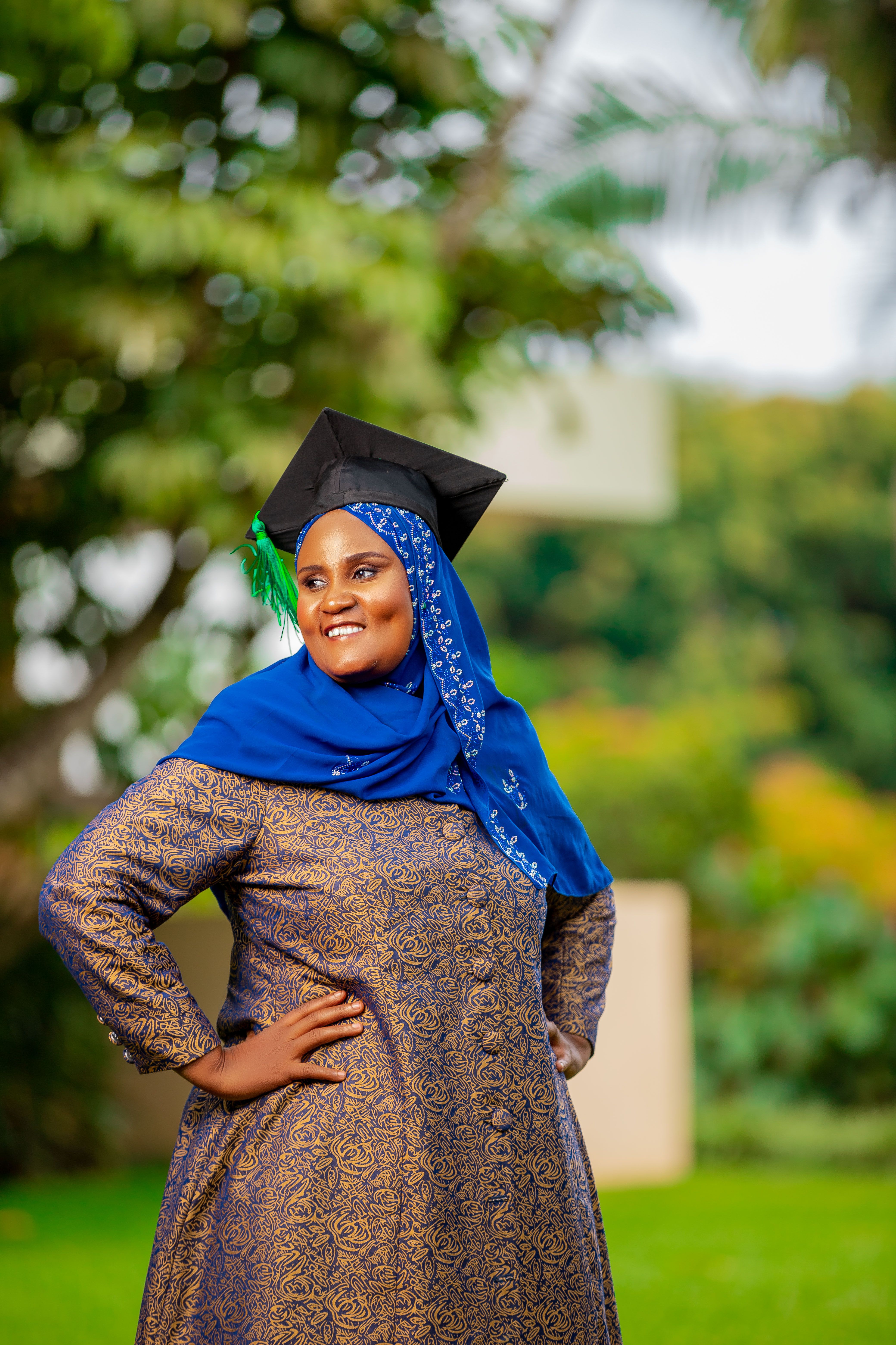 Joyful Female Graduate Outdoors on Graduation Day · Free Stock Photo