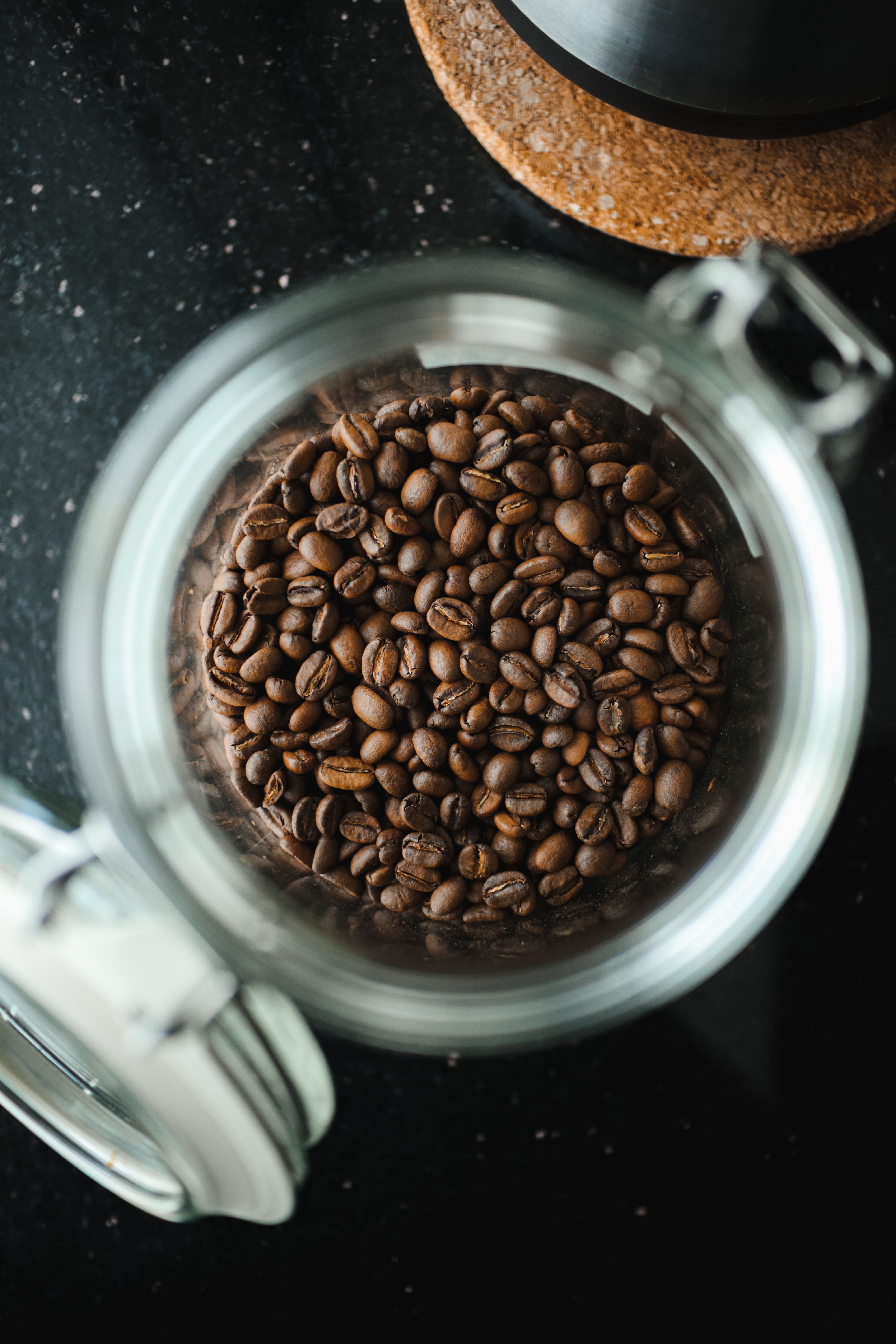 Vista Aérea De Granos De Café En Un Frasco De Vidrio · Foto de stock ...
