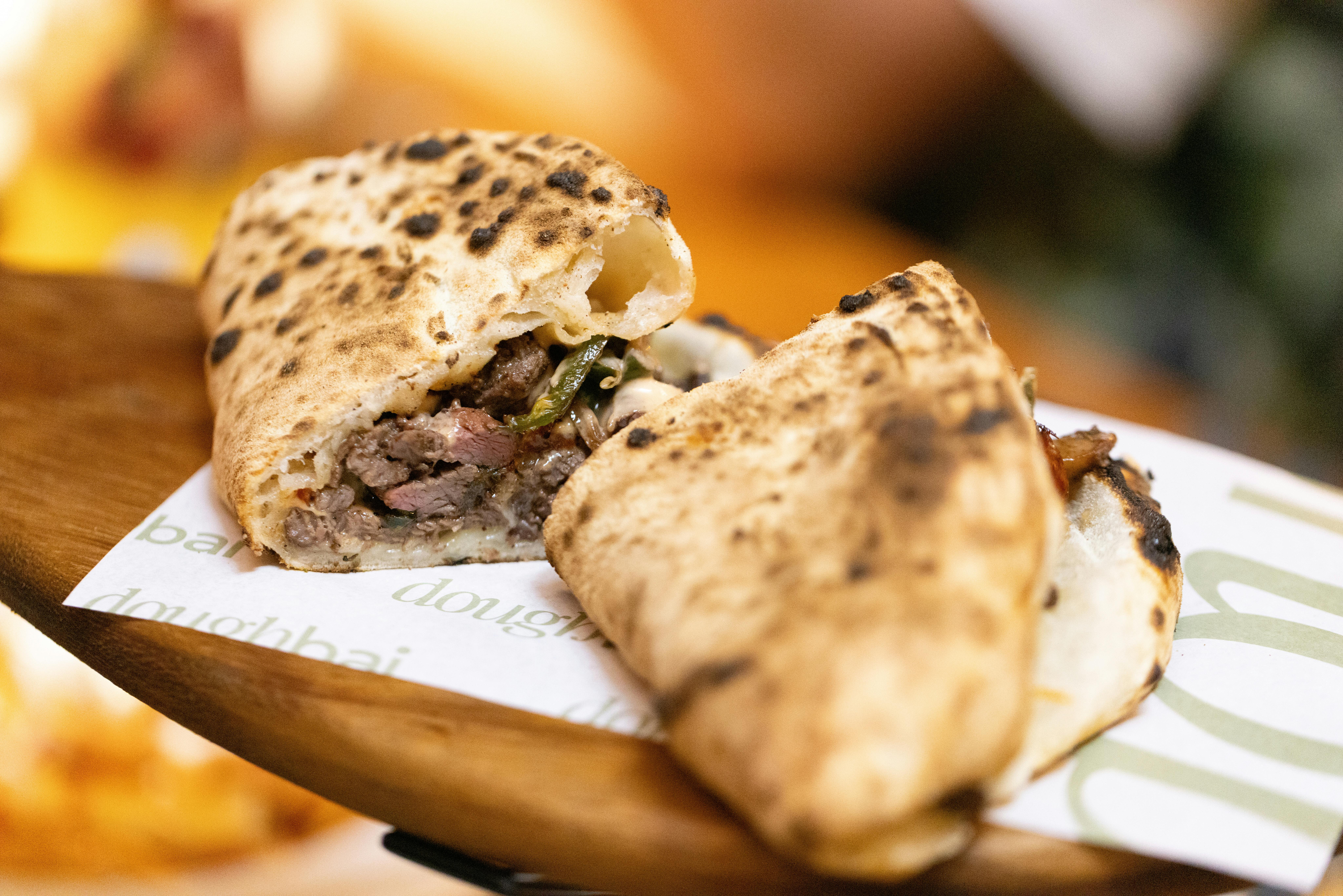 Delicious Folded Flatbread with Savory Filling · Free Stock Photo