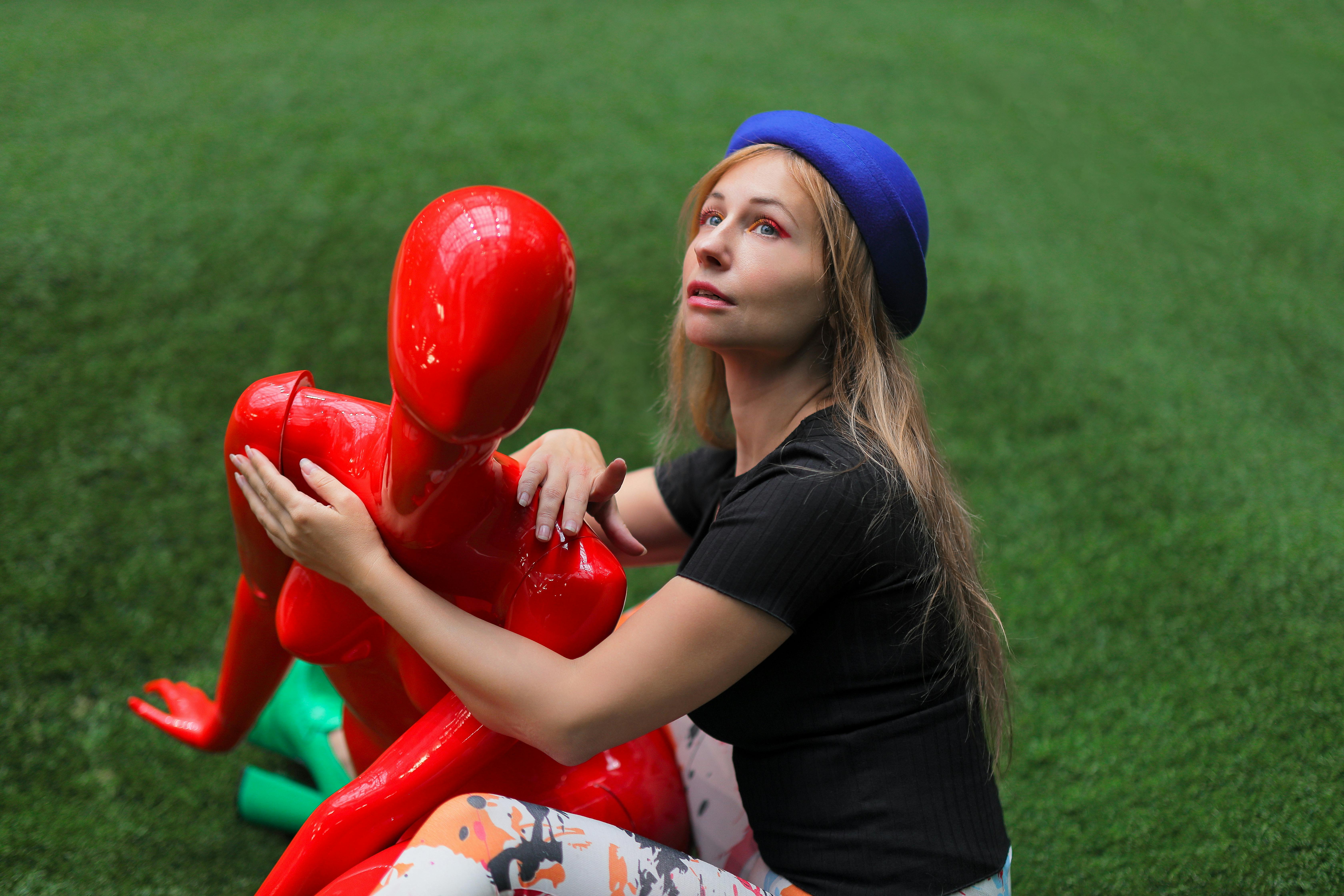 Creative Portrait with Red Mannequin and Woman · Free Stock Photo