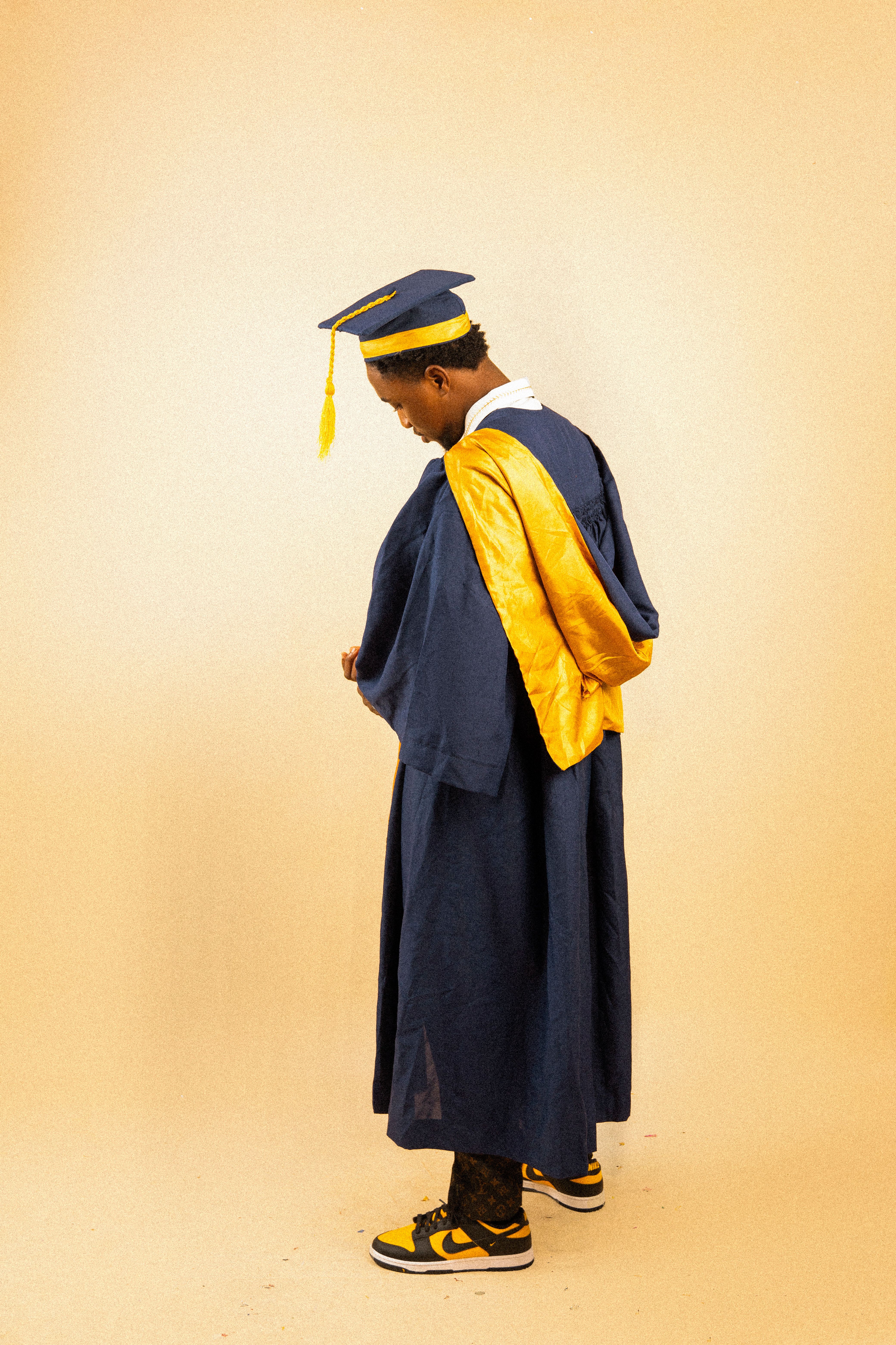 Graduation Ceremony With Cap And Gown Free Stock Photo